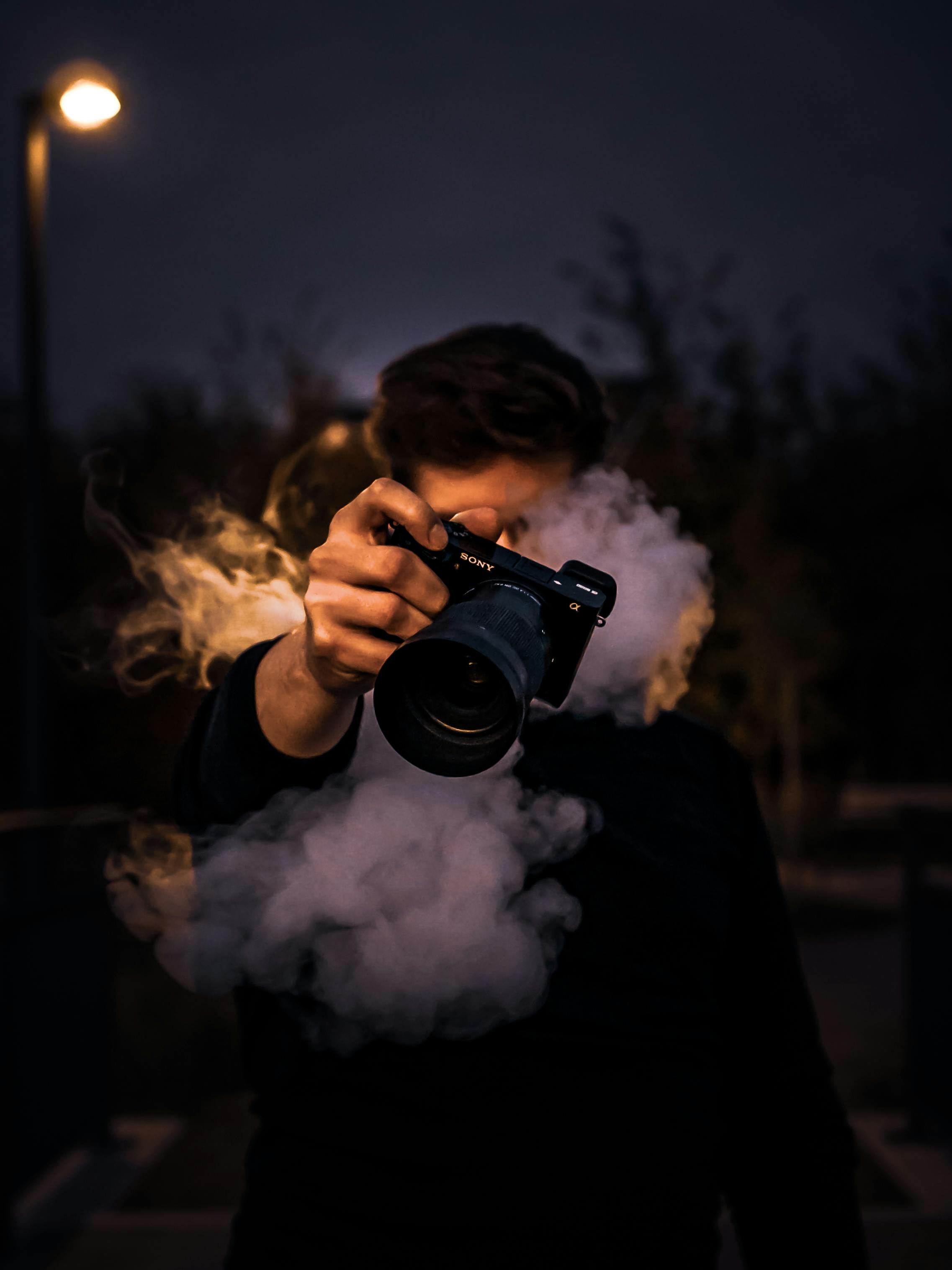 Man Holding A Camera · Free Stock Photo