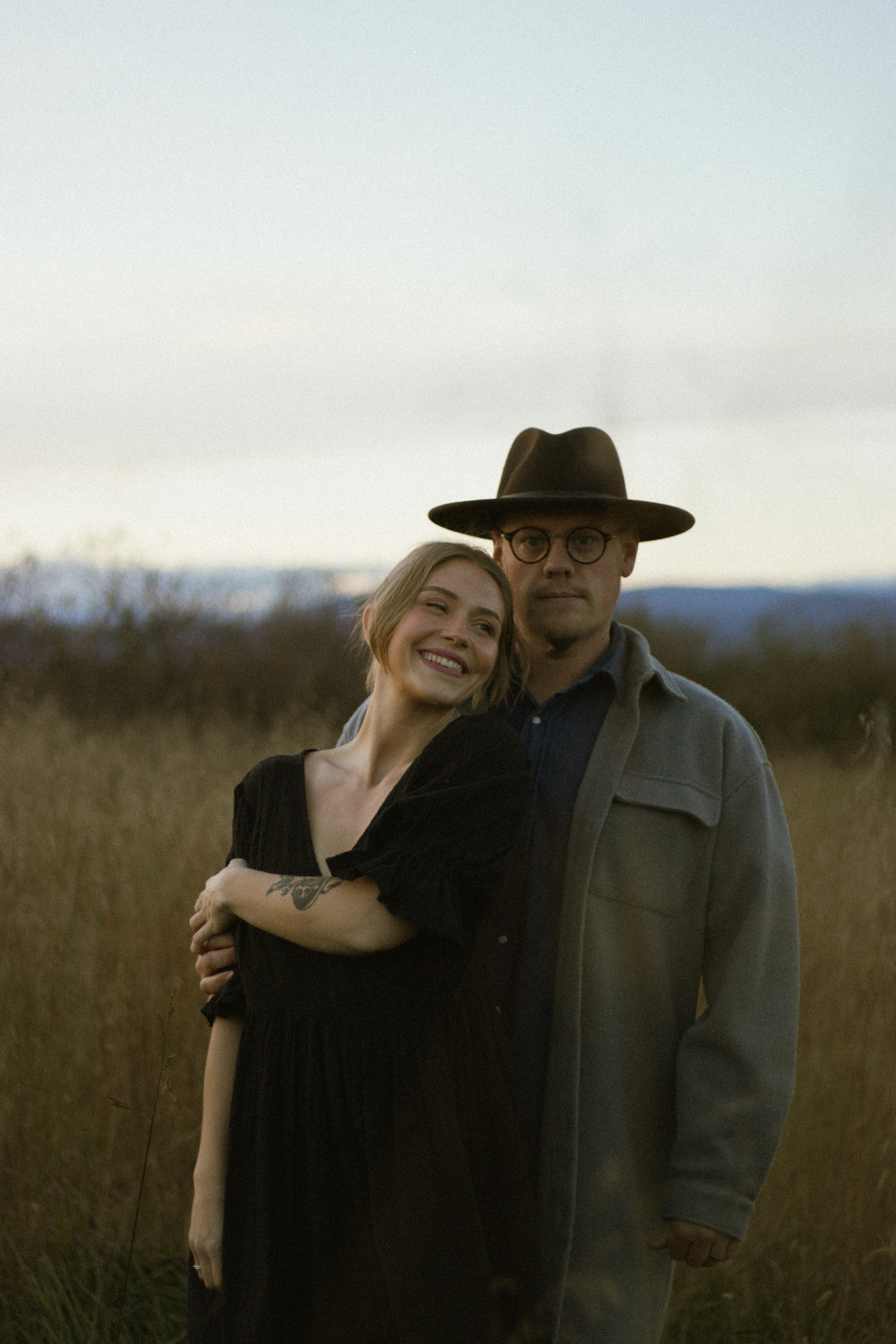 Rustic Couple's Portrait in Golden Hour · Free Stock Photo