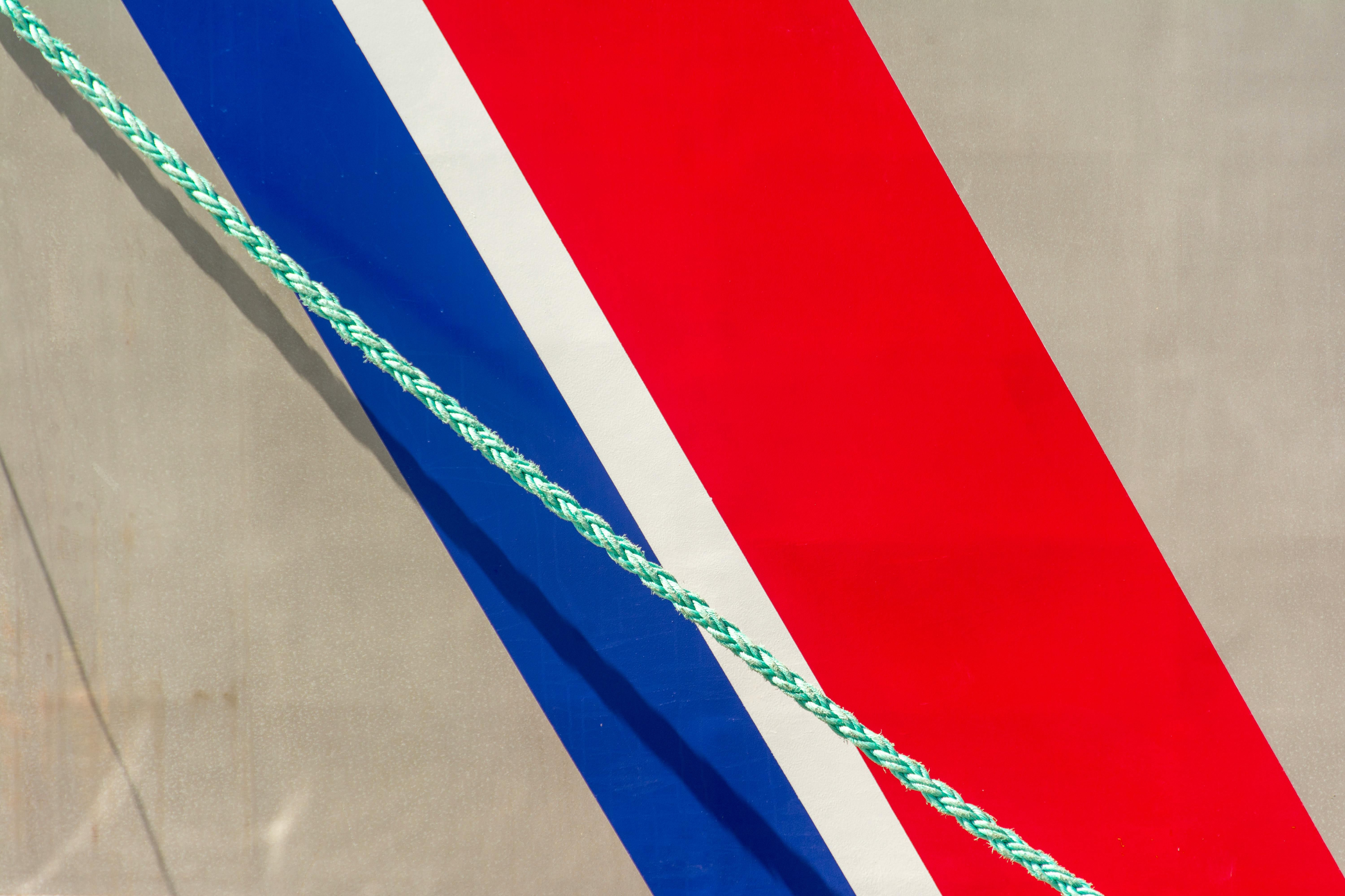Colorful Boat Stripes with Diagonal Rope Detail · Free Stock Photo