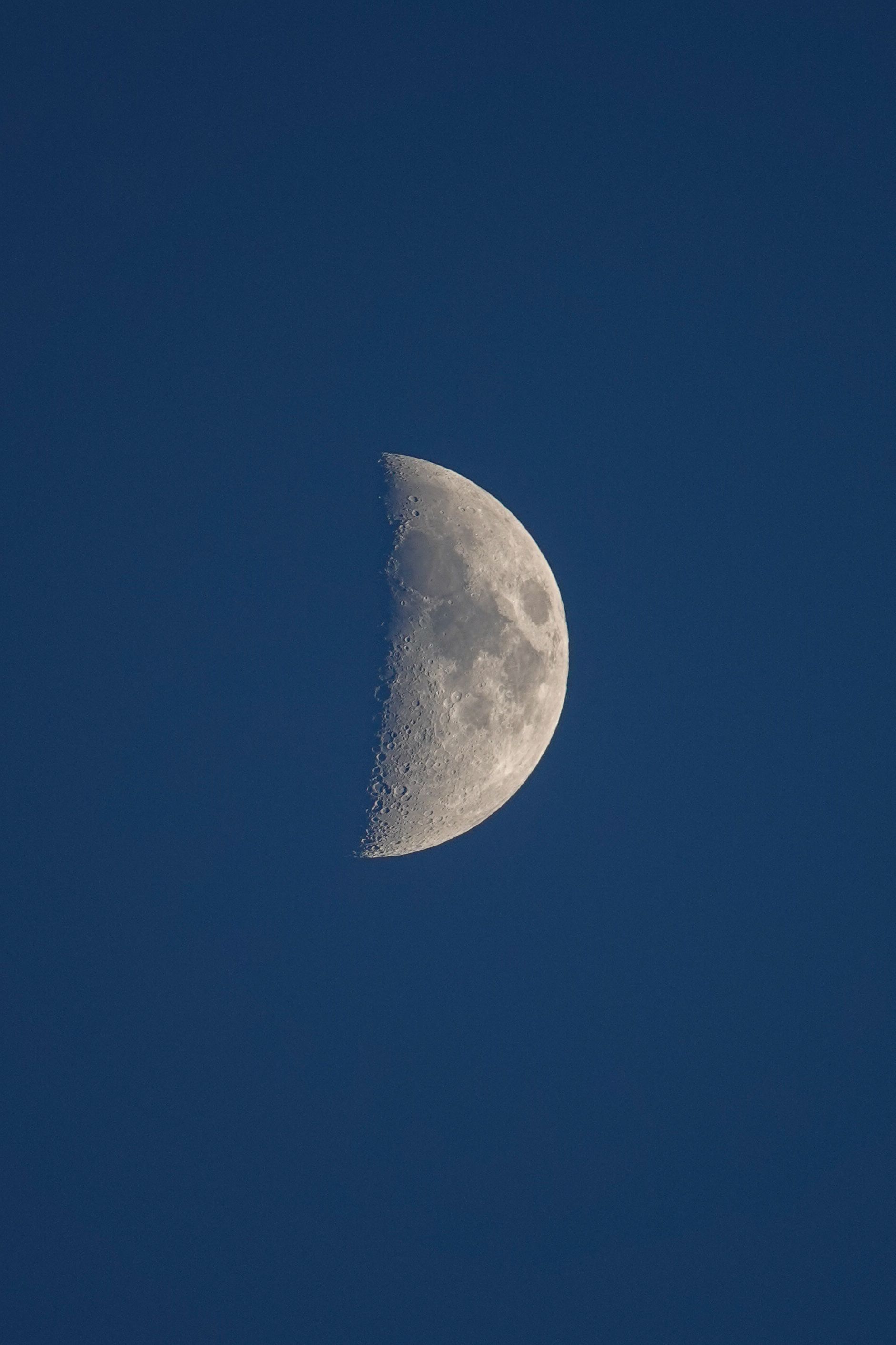 Crescent Moon Against Deep Blue Sky · Free Stock Photo