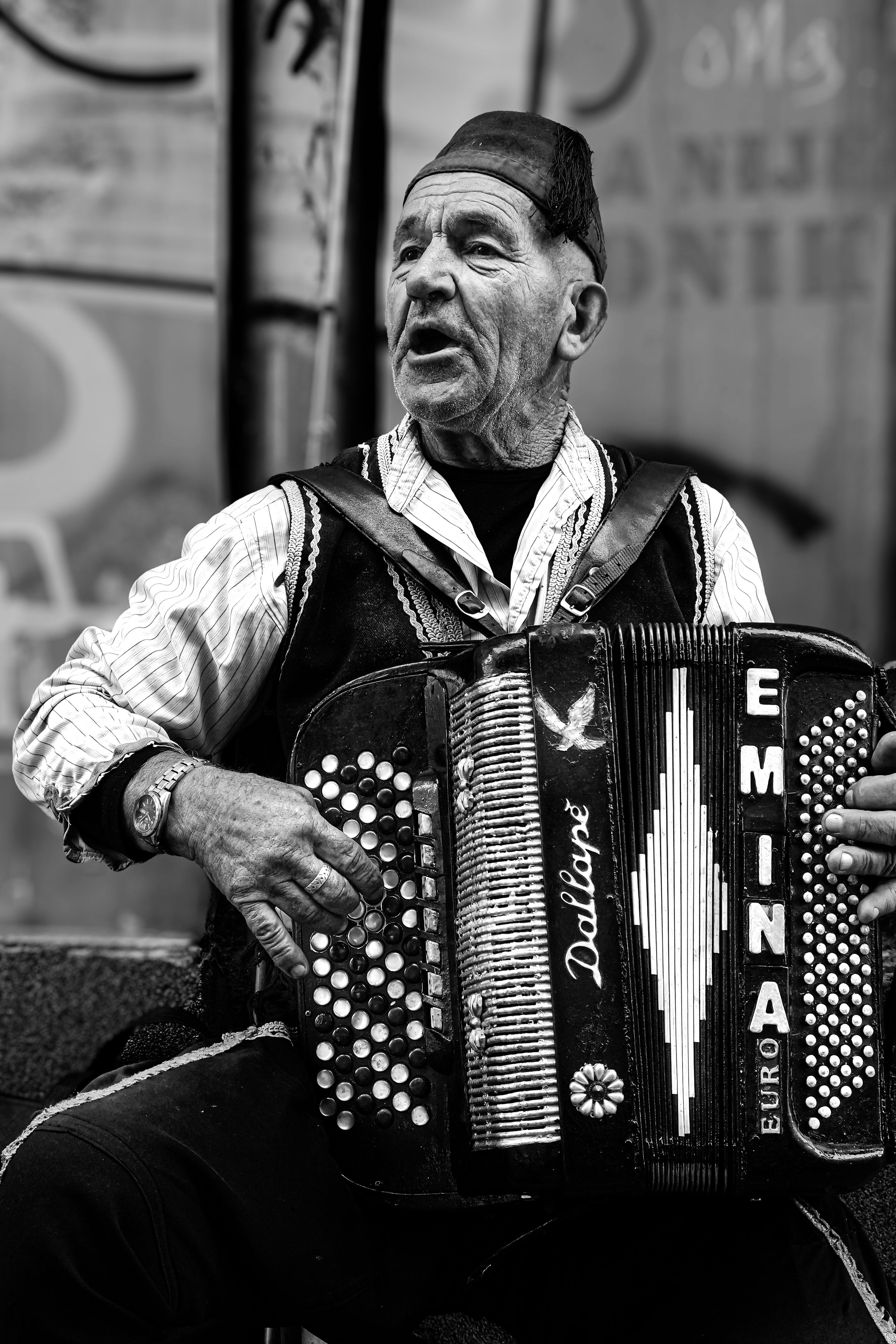 Street Musician in Sarajevo Playing Accordion · Free Stock Photo