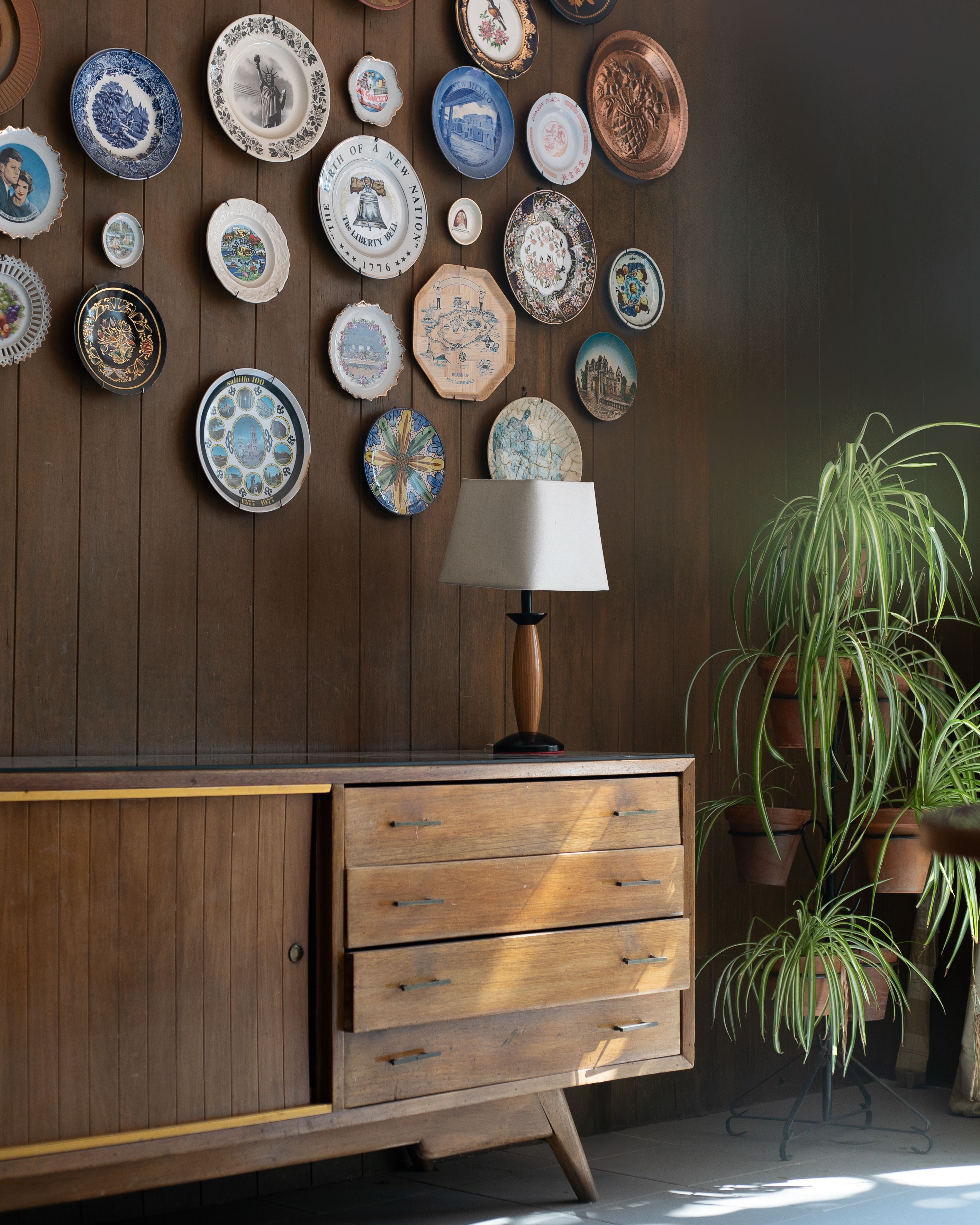 Vintage Wall Display with Decor Plates and Wooden Cabinet · Free Stock ...