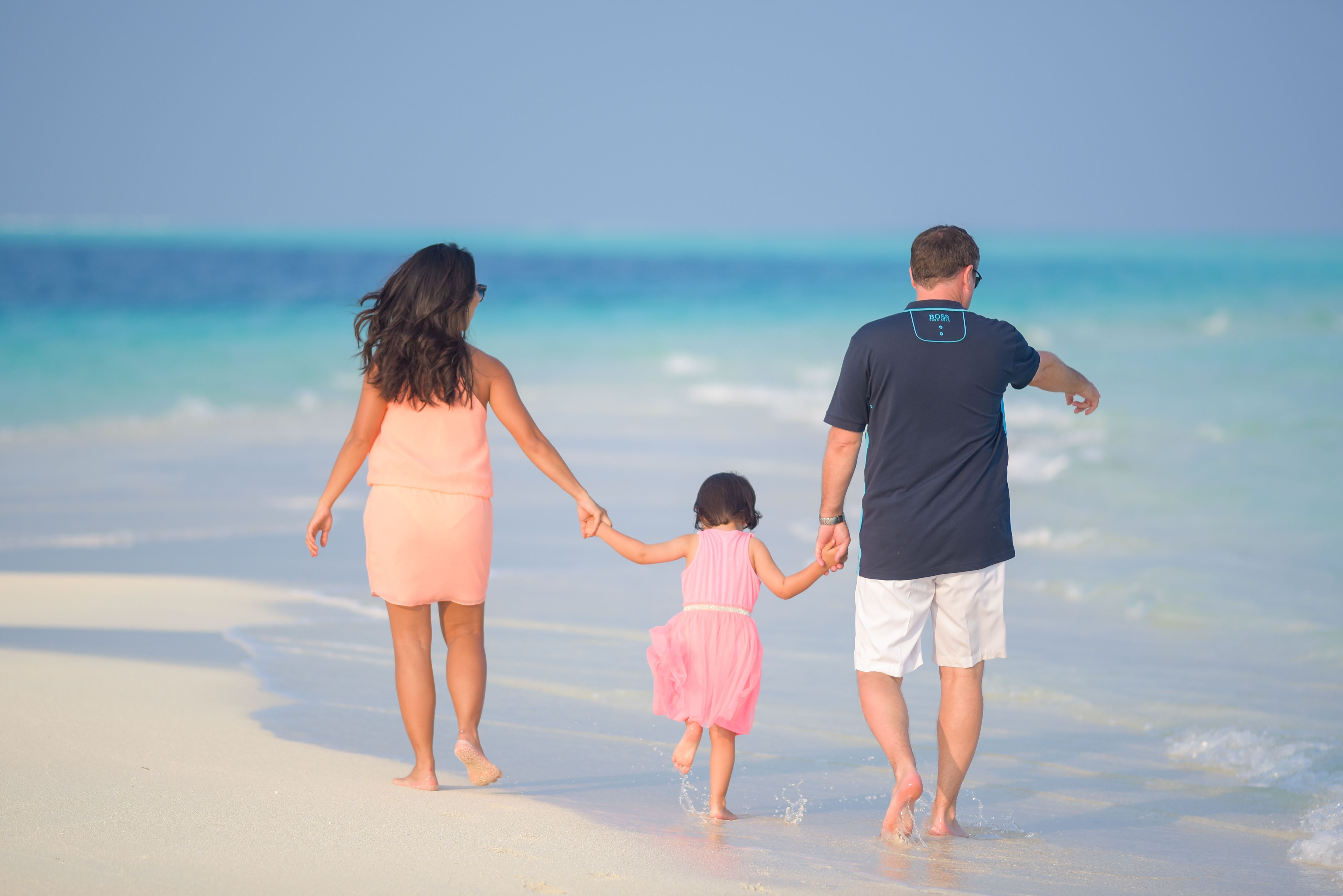 Family enjoying a day at the beach together · Free Stock Photo