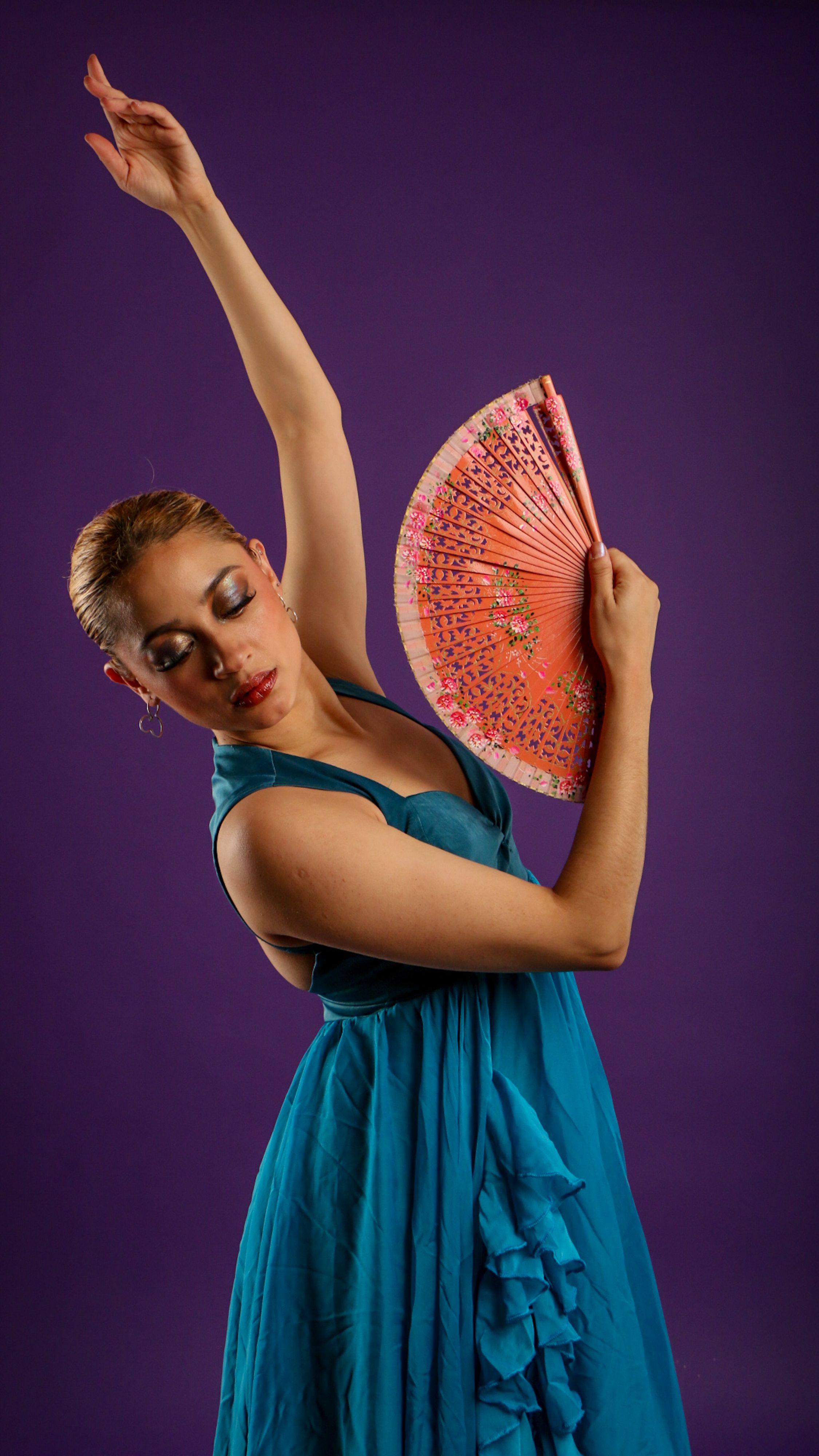 Elegant Woman Performing Flamenco Dance with Fan · Free Stock Photo