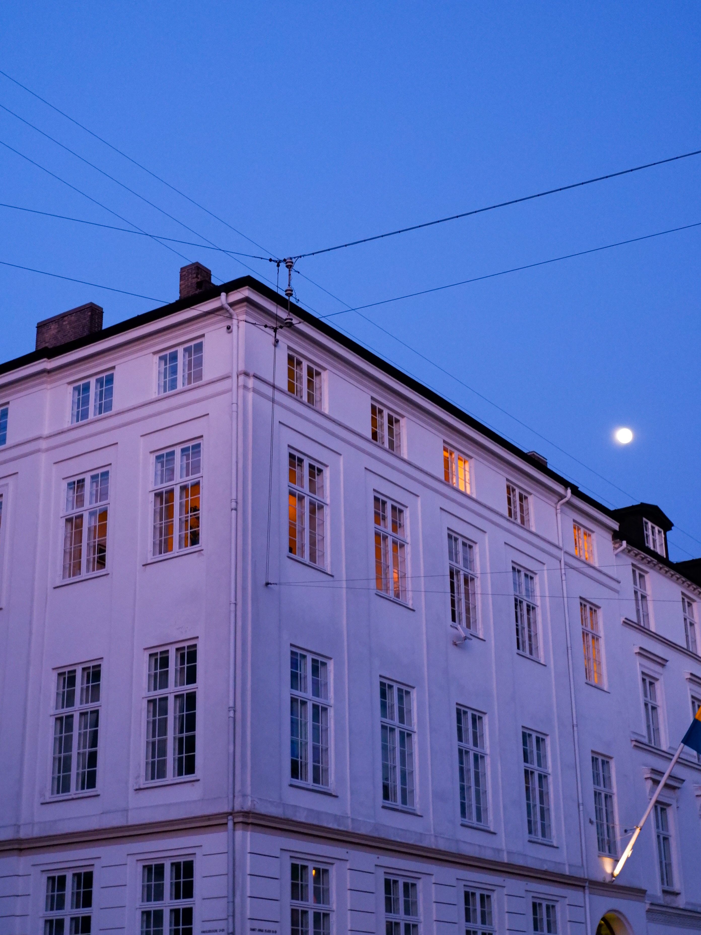 Historic Building Under a Moonlit Sky in Copenhagen · Free Stock Photo