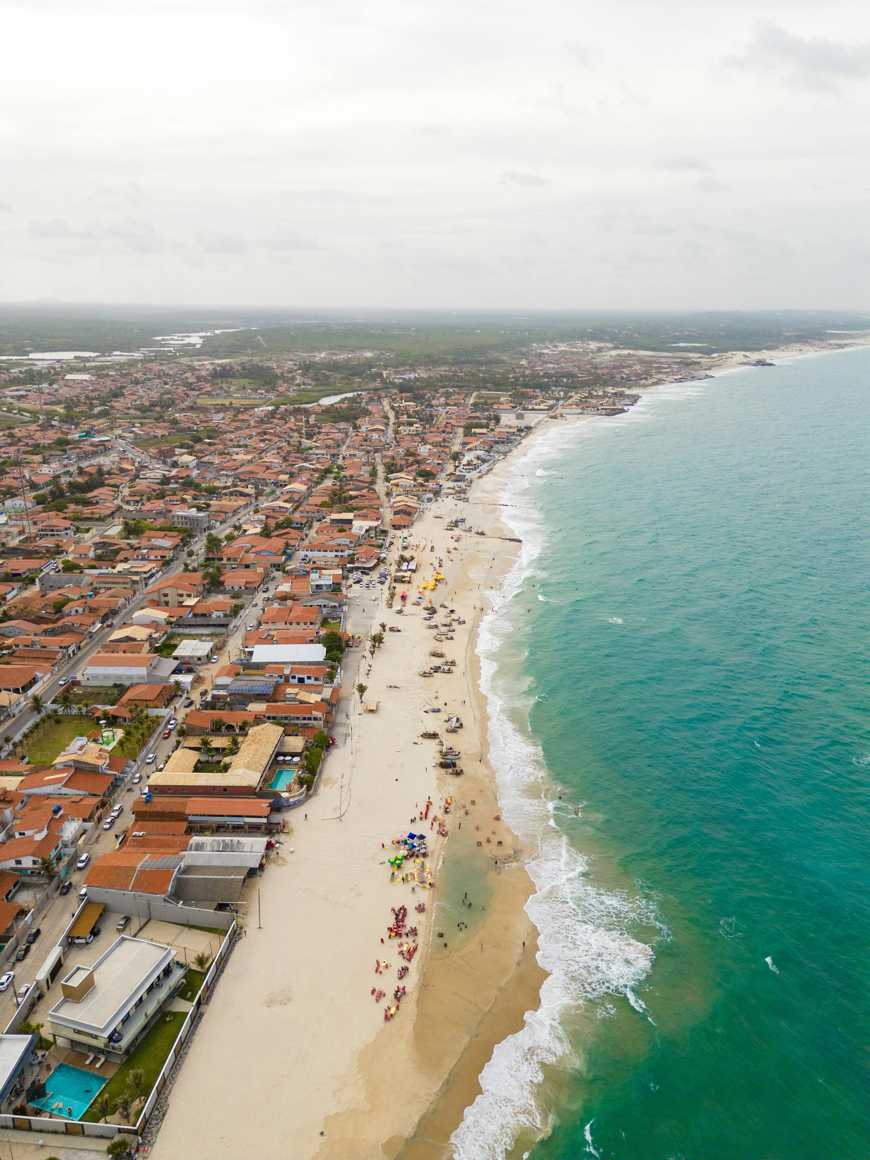 Aerial View of Busy Coastal Beachfront Town · Free Stock Photo