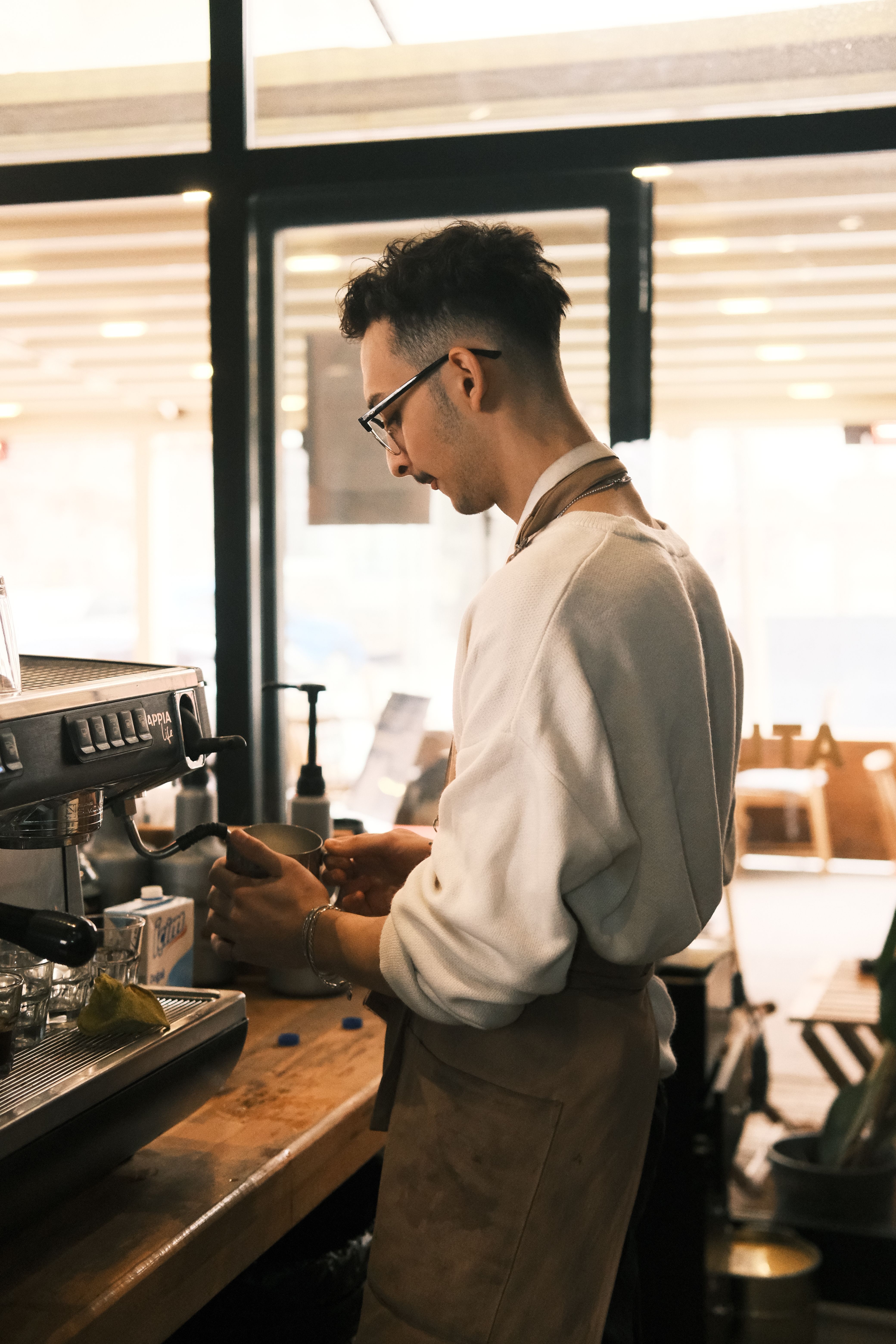 Experienced Barista Making Coffee in Modern Café · Free Stock Photo