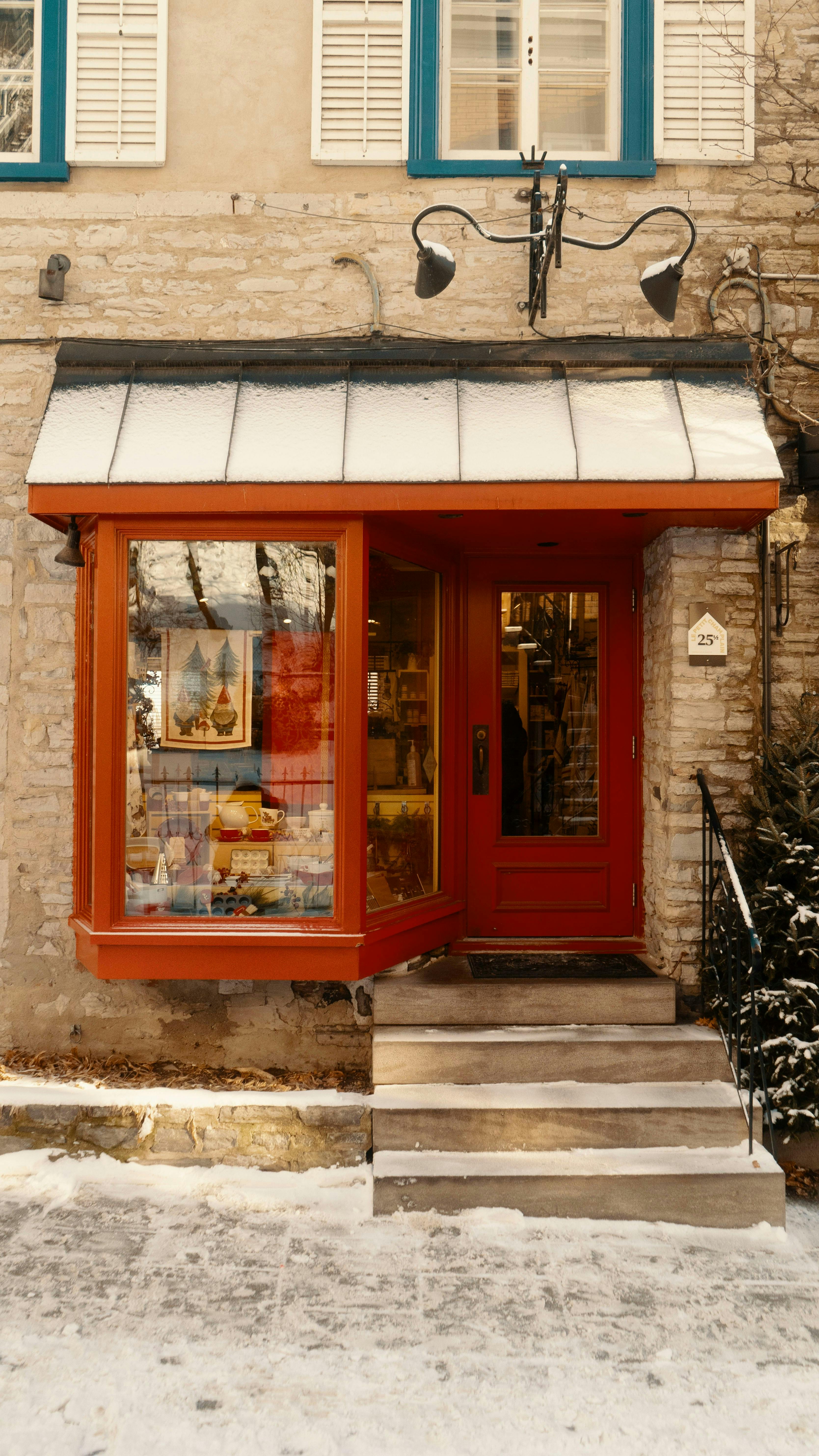 Charming Winter Boutique Shopfront in Snow · Free Stock Photo