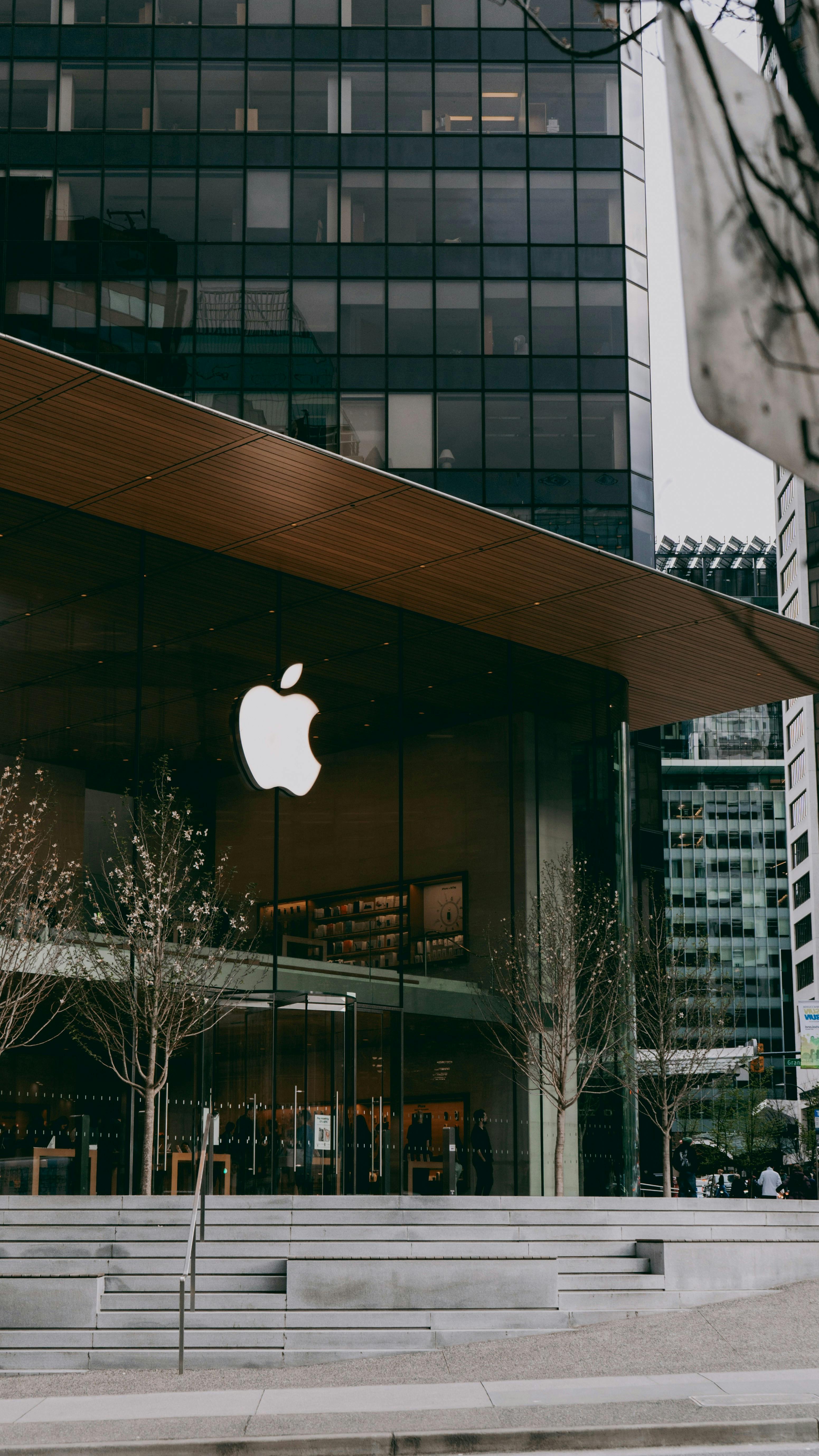 Modern Glass Facade of Apple Store Building · Free Stock Photo