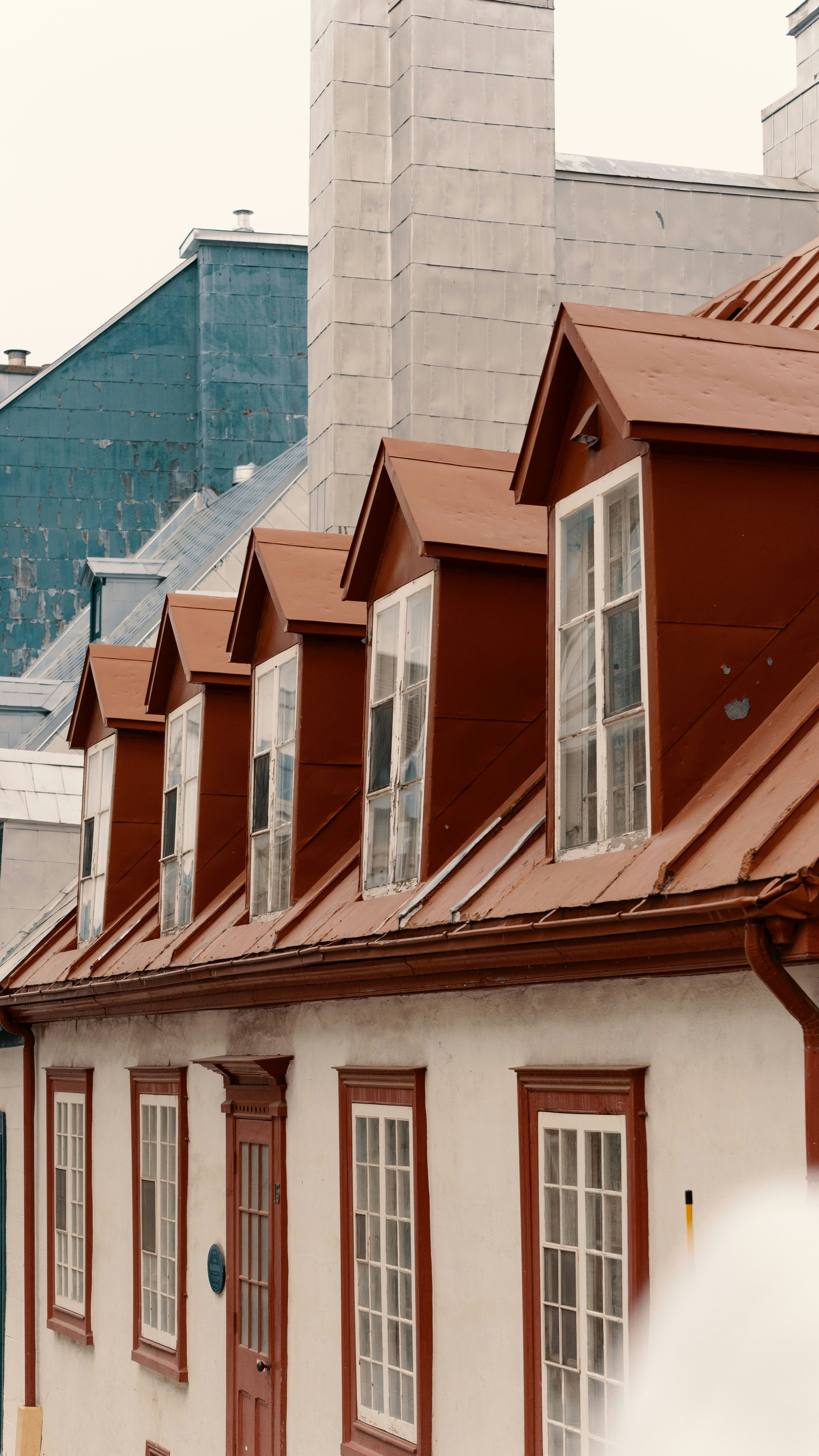Historic Red Roof Houses in Urban Setting · Free Stock Photo
