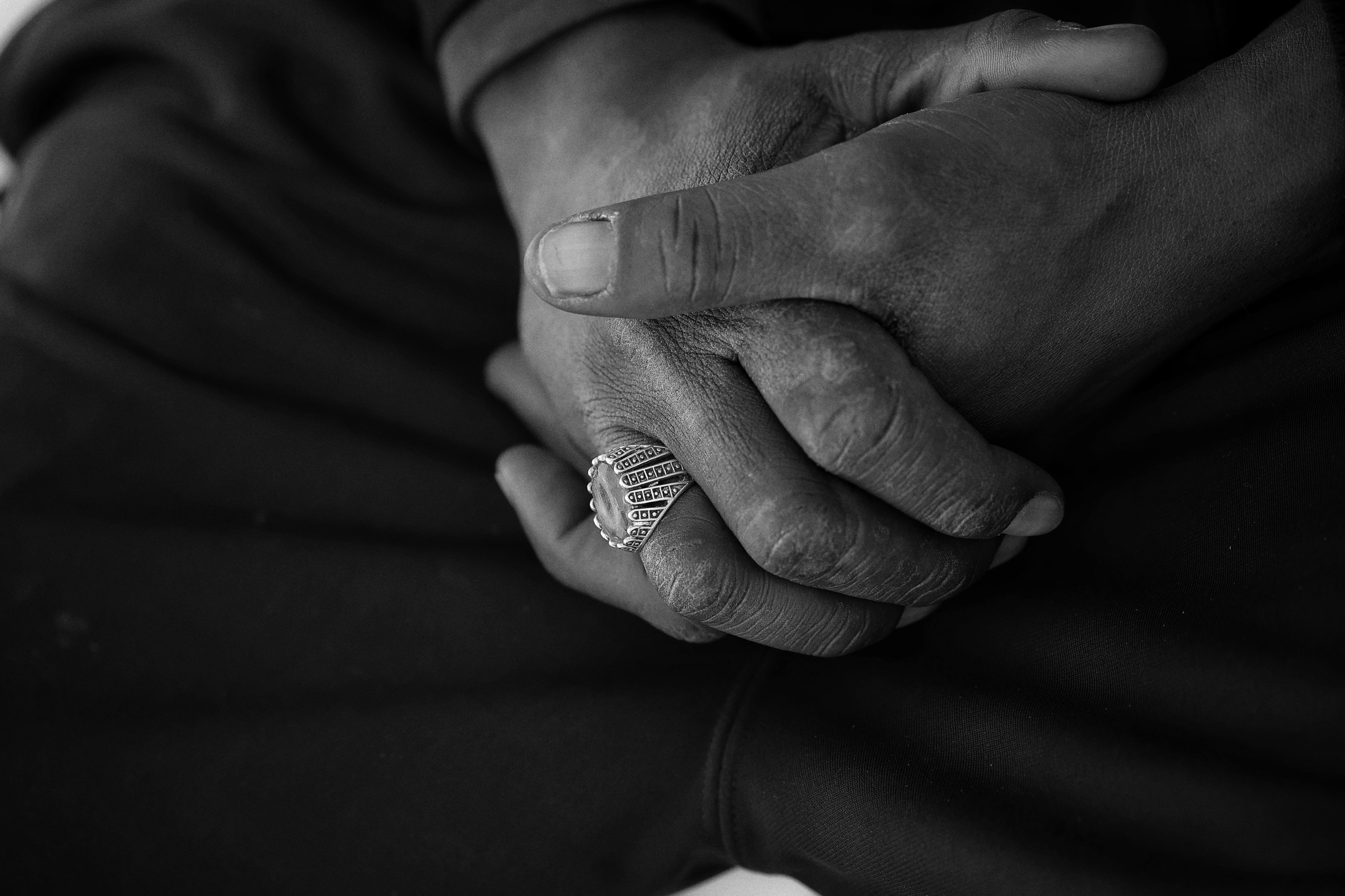Close-up of Interlocked Hands with Ring in Black and White · Free Stock ...