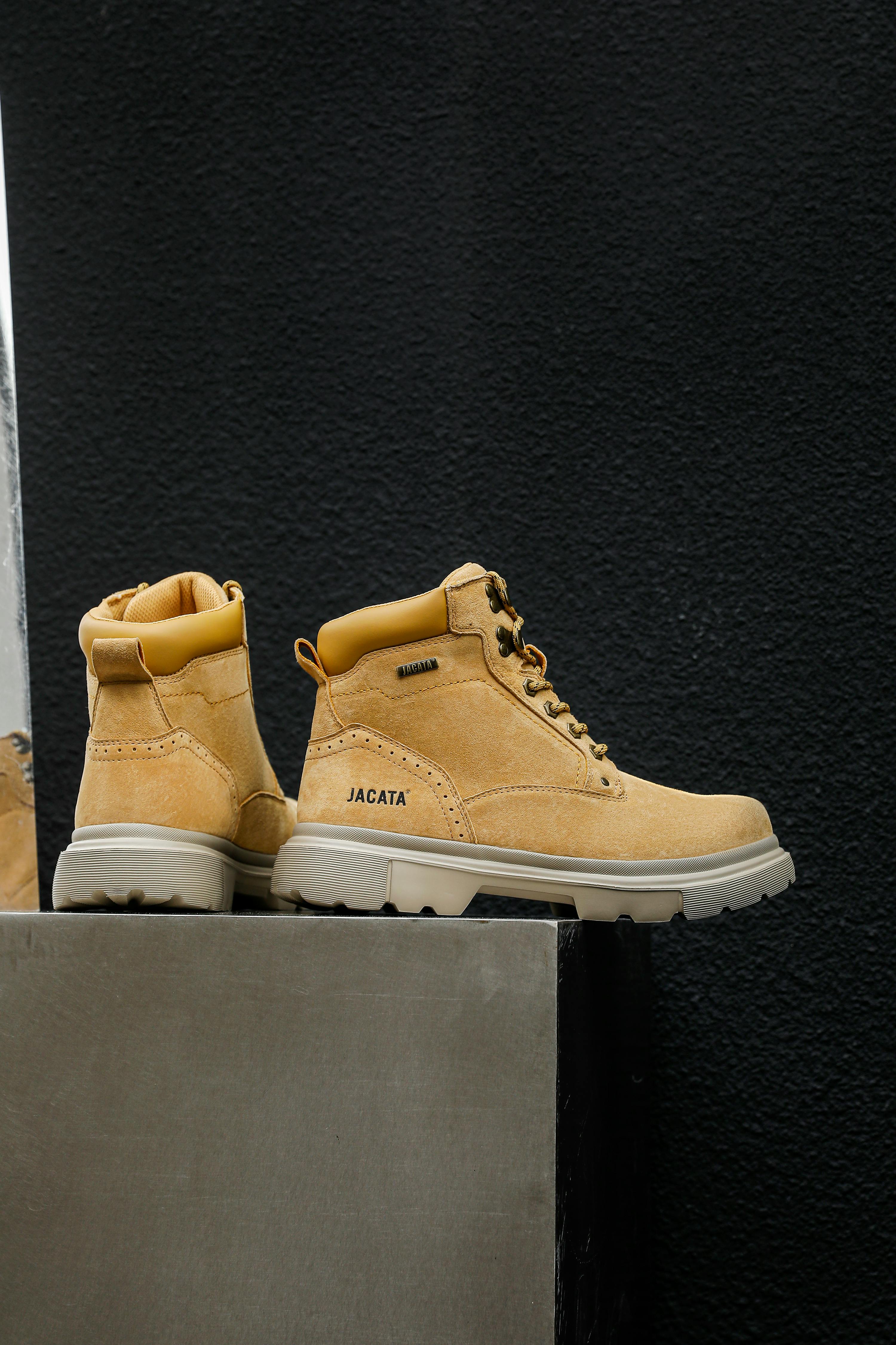 Stylish Tan Hiking Boots on Display · Free Stock Photo