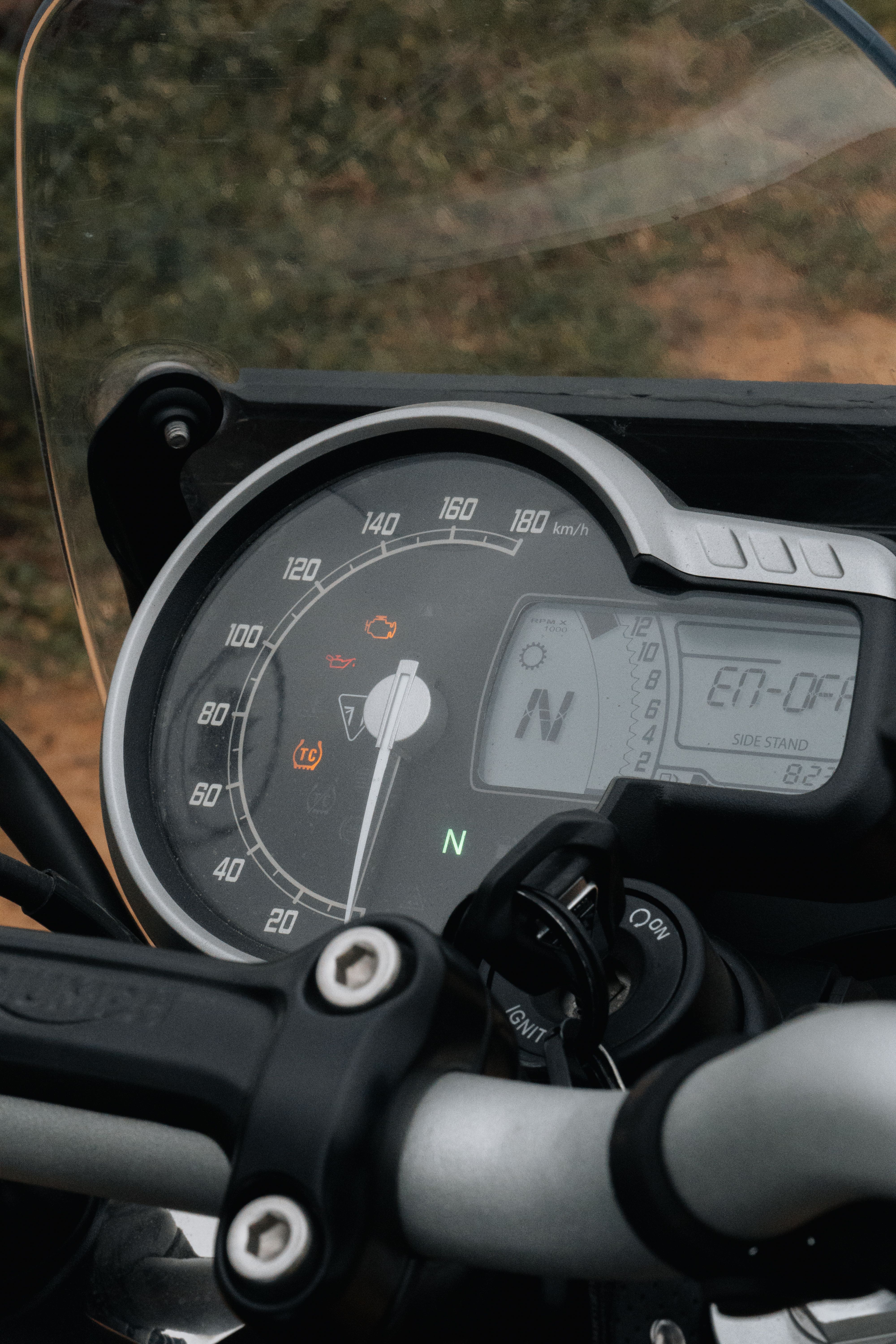 Close-up of Motorcycle Speedometer Handlebar View · Free Stock Photo