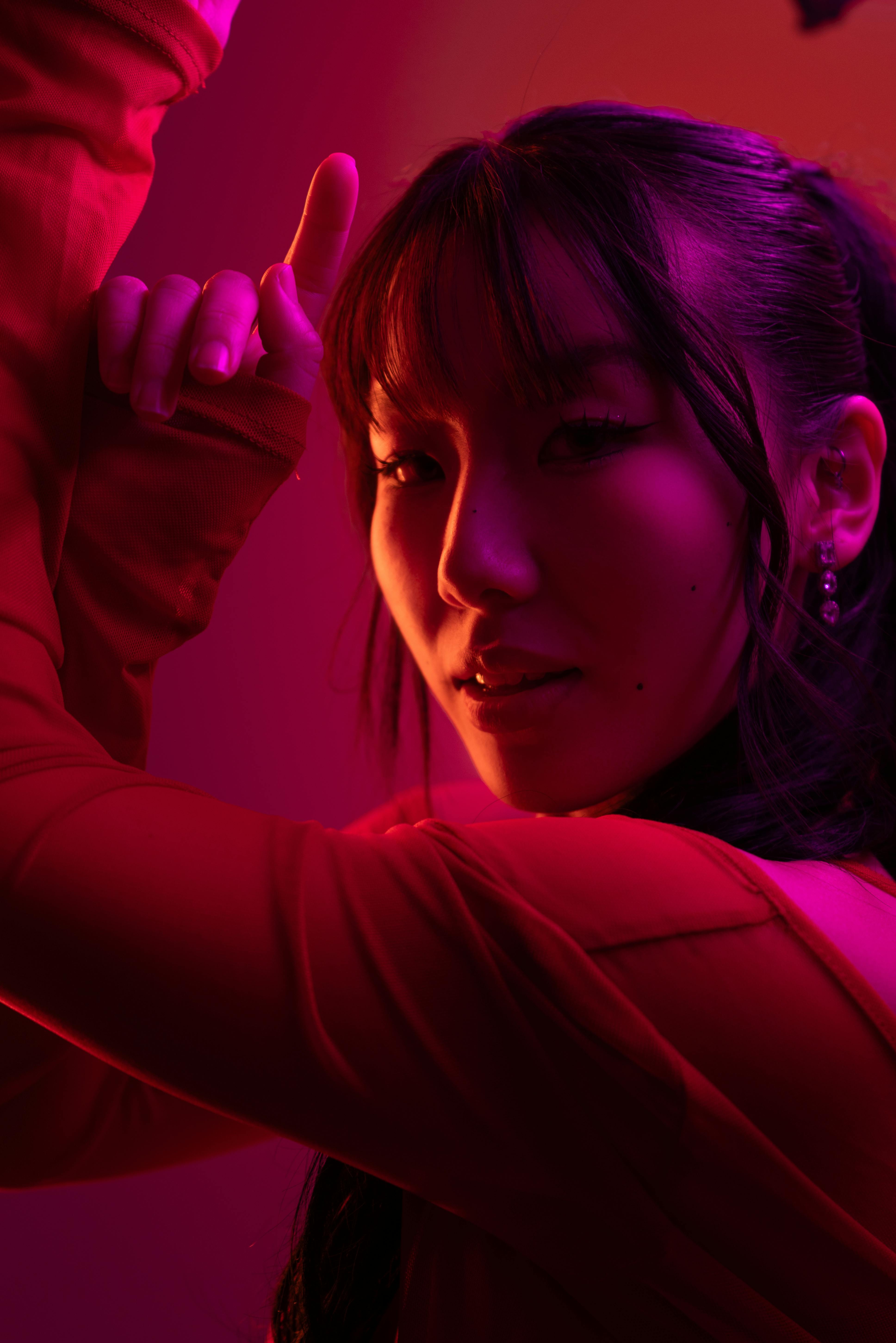 Moody Portrait in Dramatic Red Lighting · Free Stock Photo