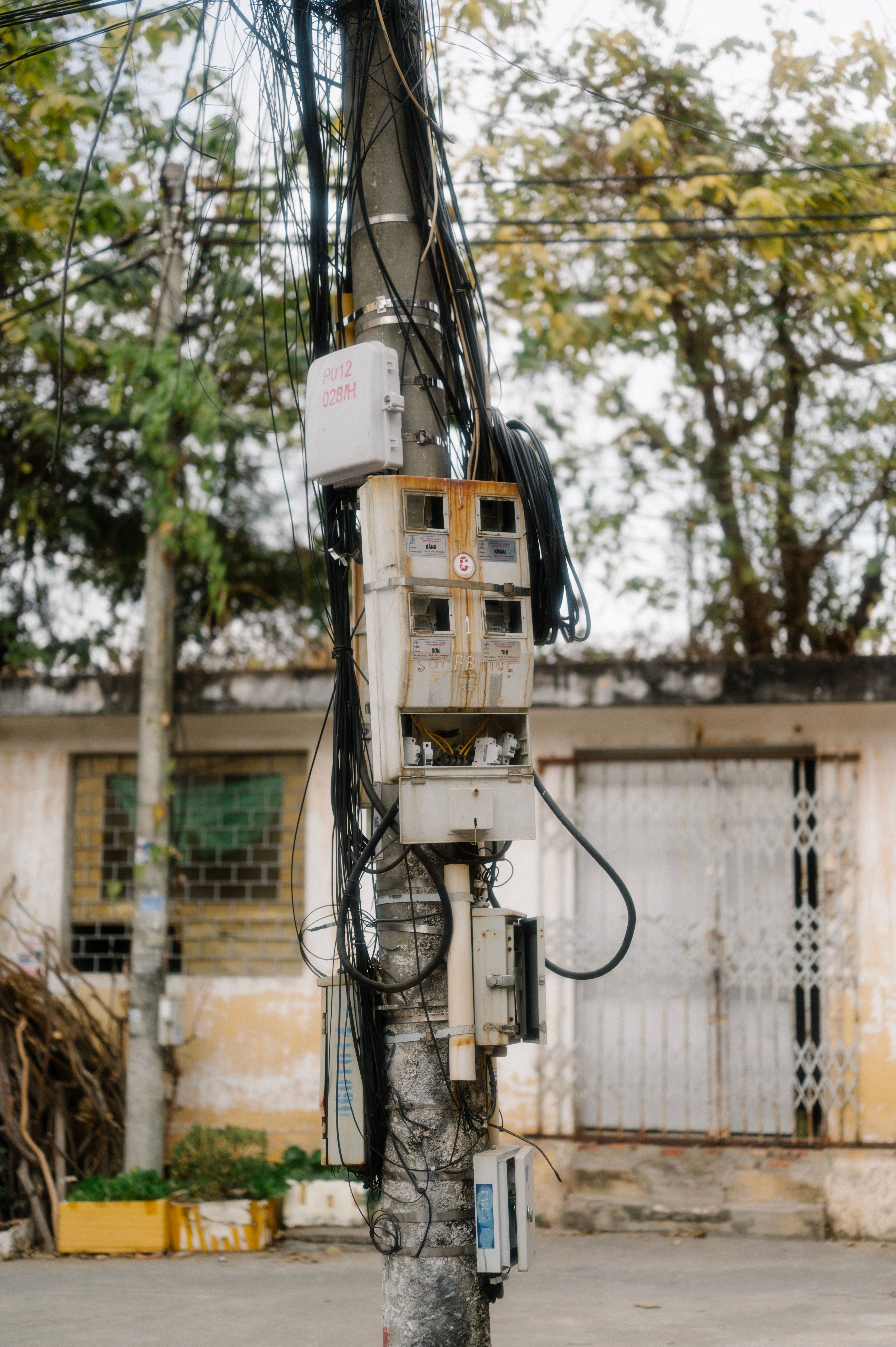 Urban Utility Pole with Tangled Wires in Vietnam · Free Stock Photo