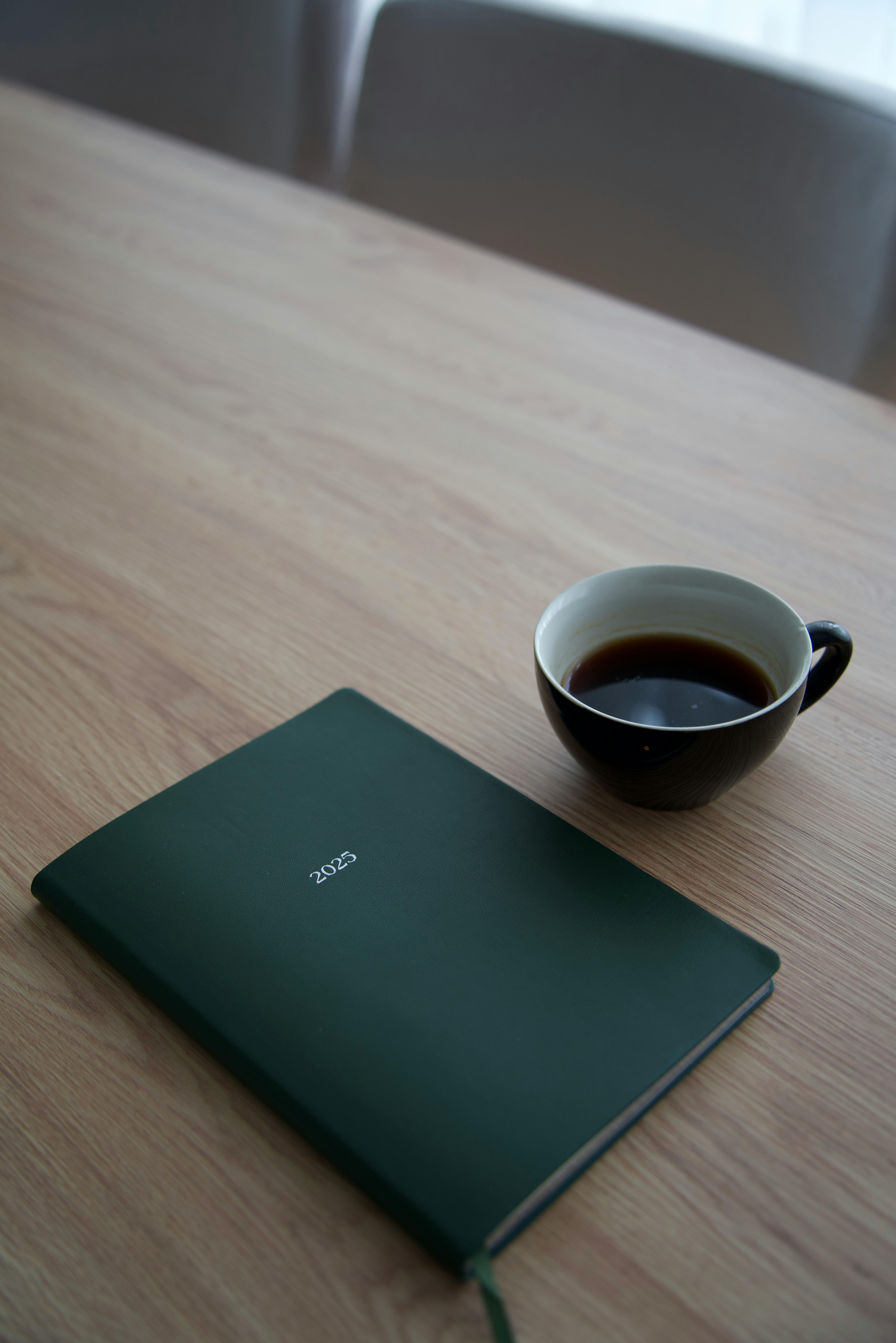 Minimalist Desk Setup with Coffee and Journal · Free Stock Photo