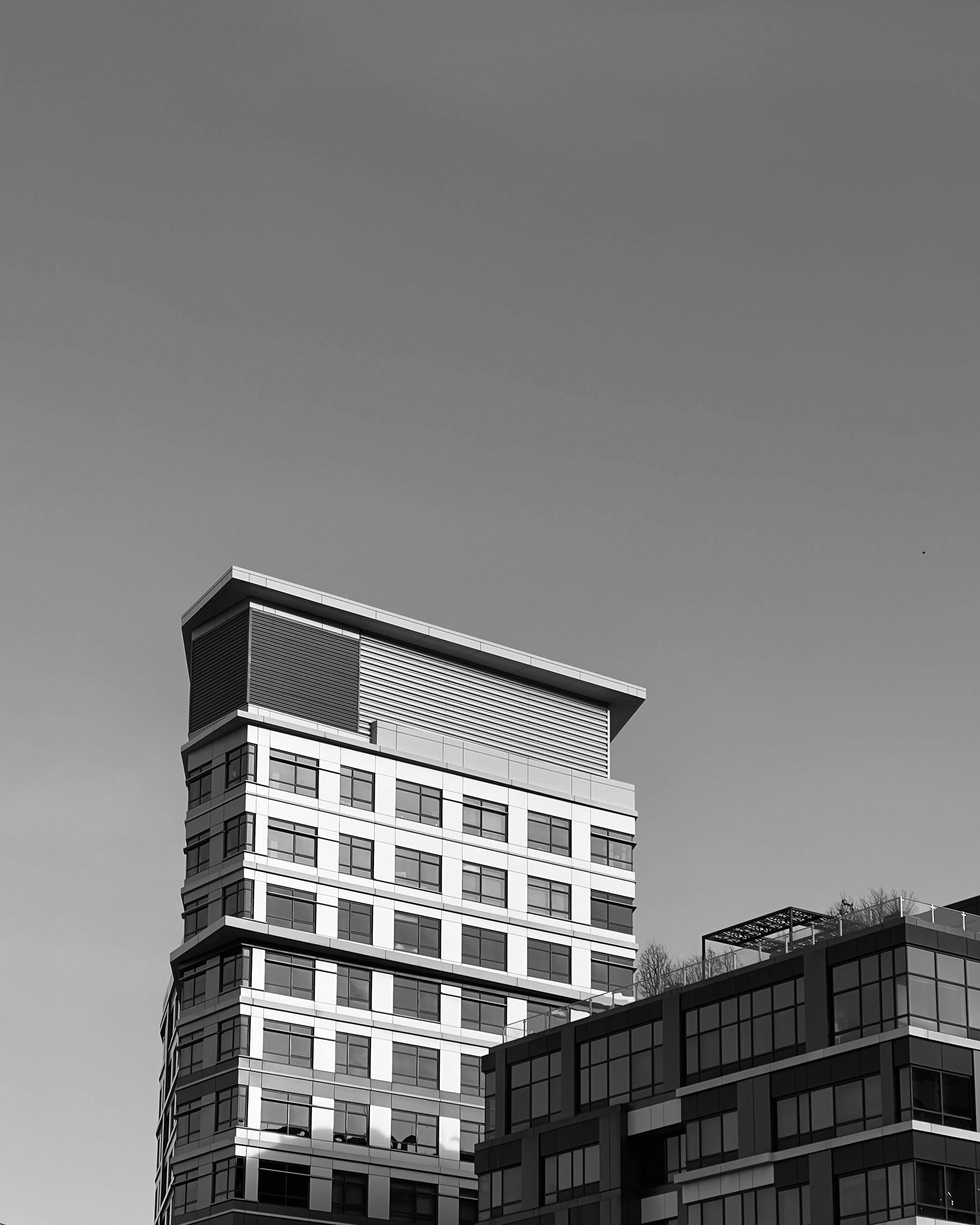 Modern High-Rise Building Against Clear Sky · Free Stock Photo