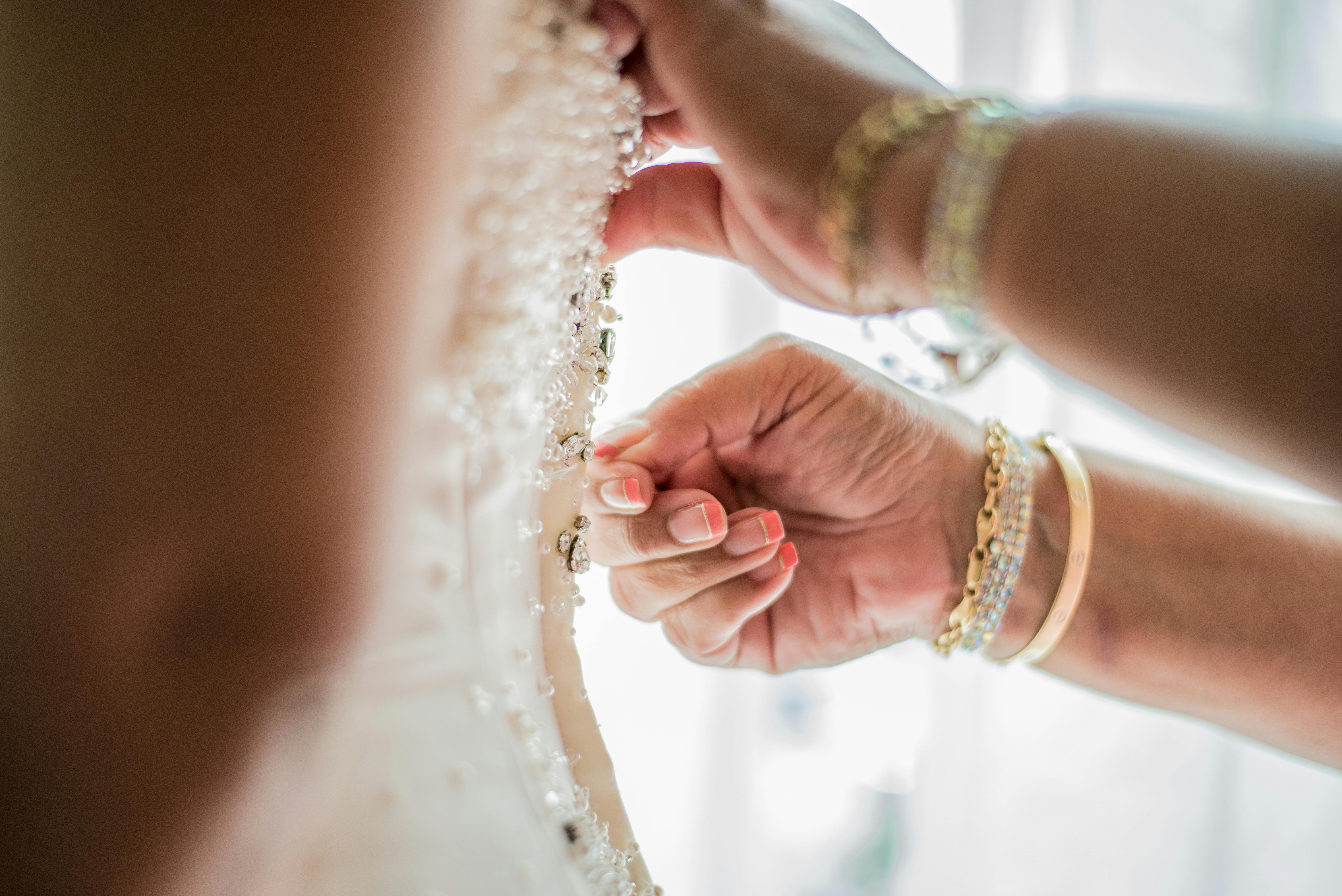 Person Holding Dress · Free Stock Photo
