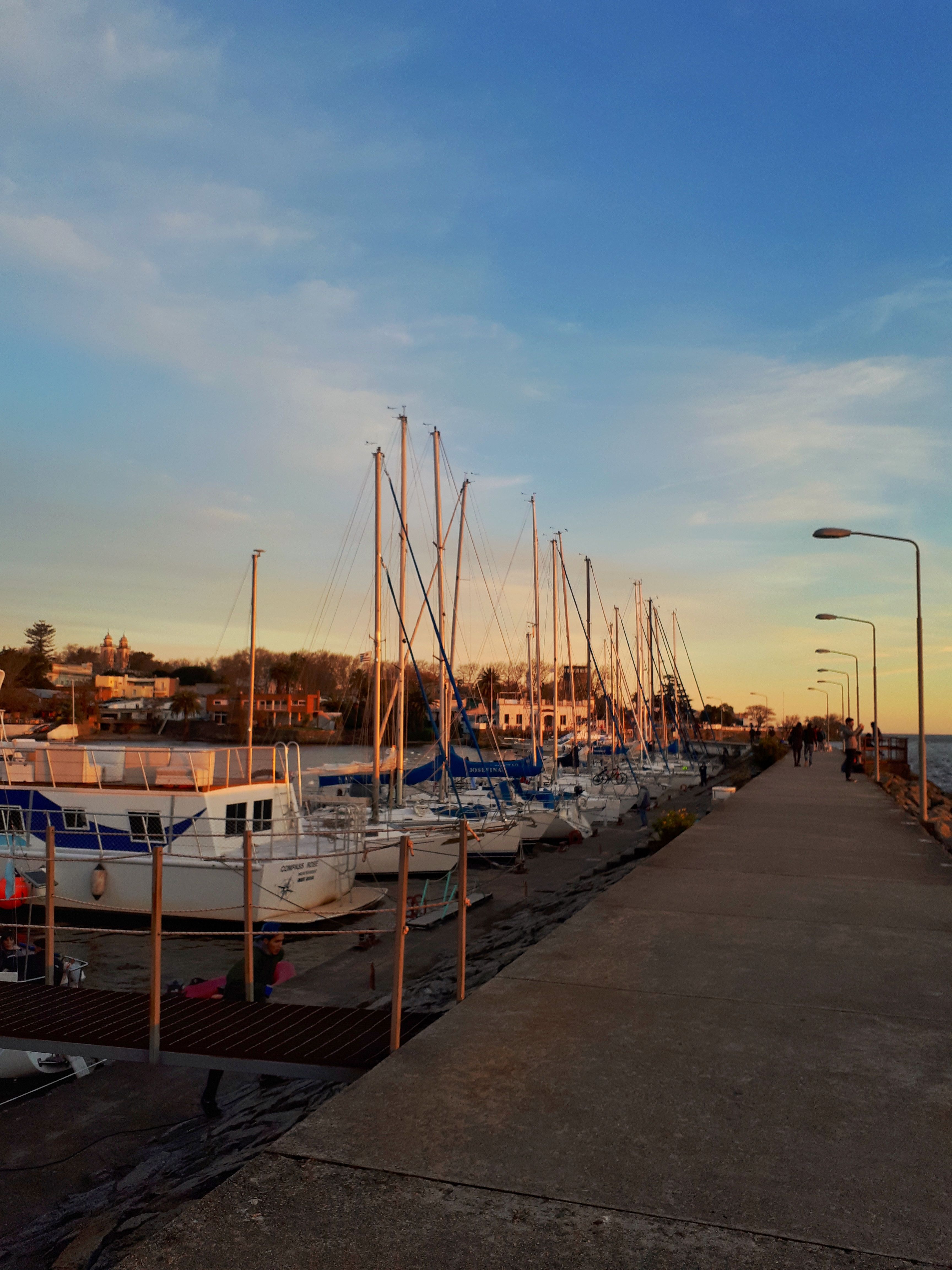 Tranquil Seaside Marina at Sunset · Free Stock Photo