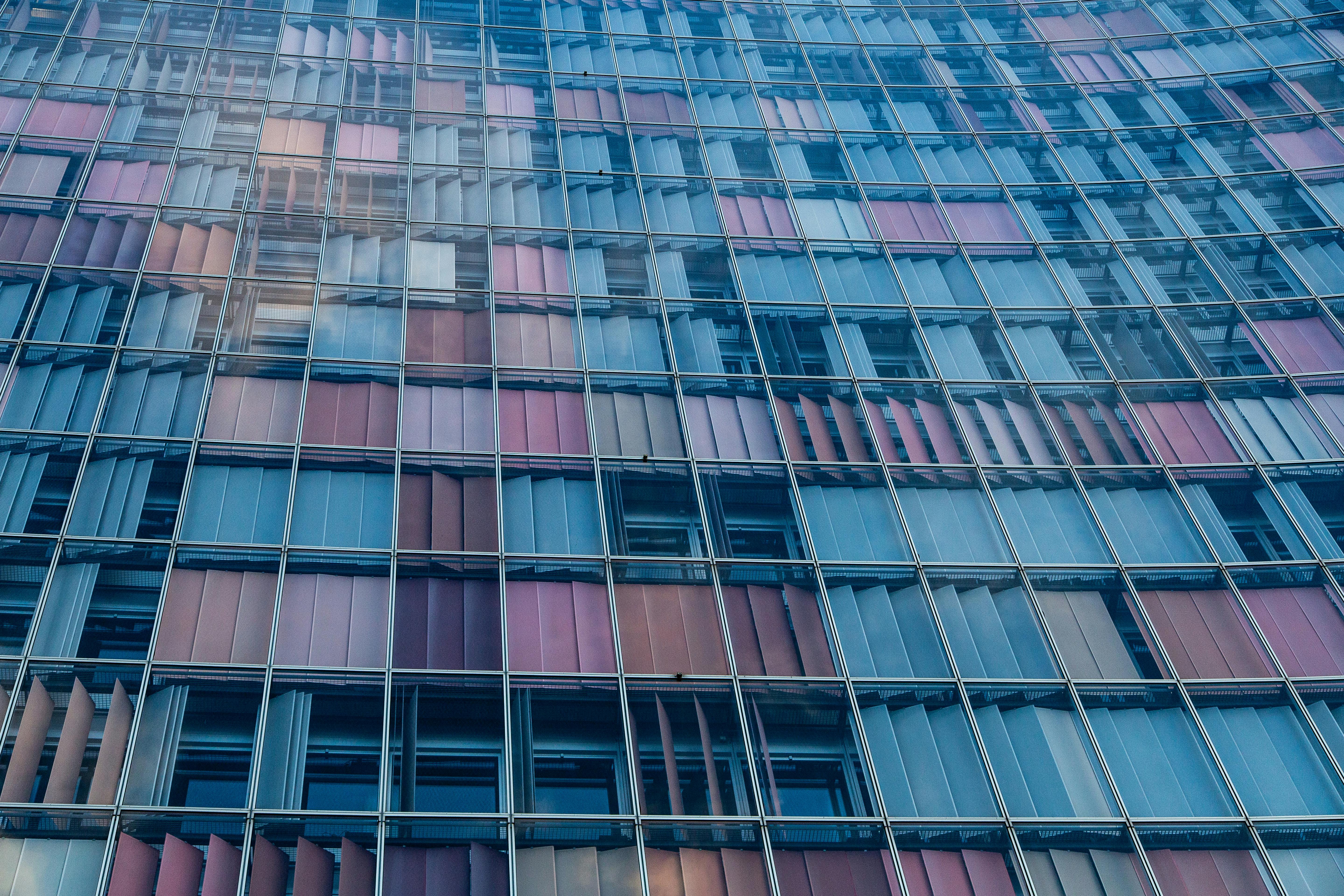 Modern Glass Facade with Colorful Panels · Free Stock Photo