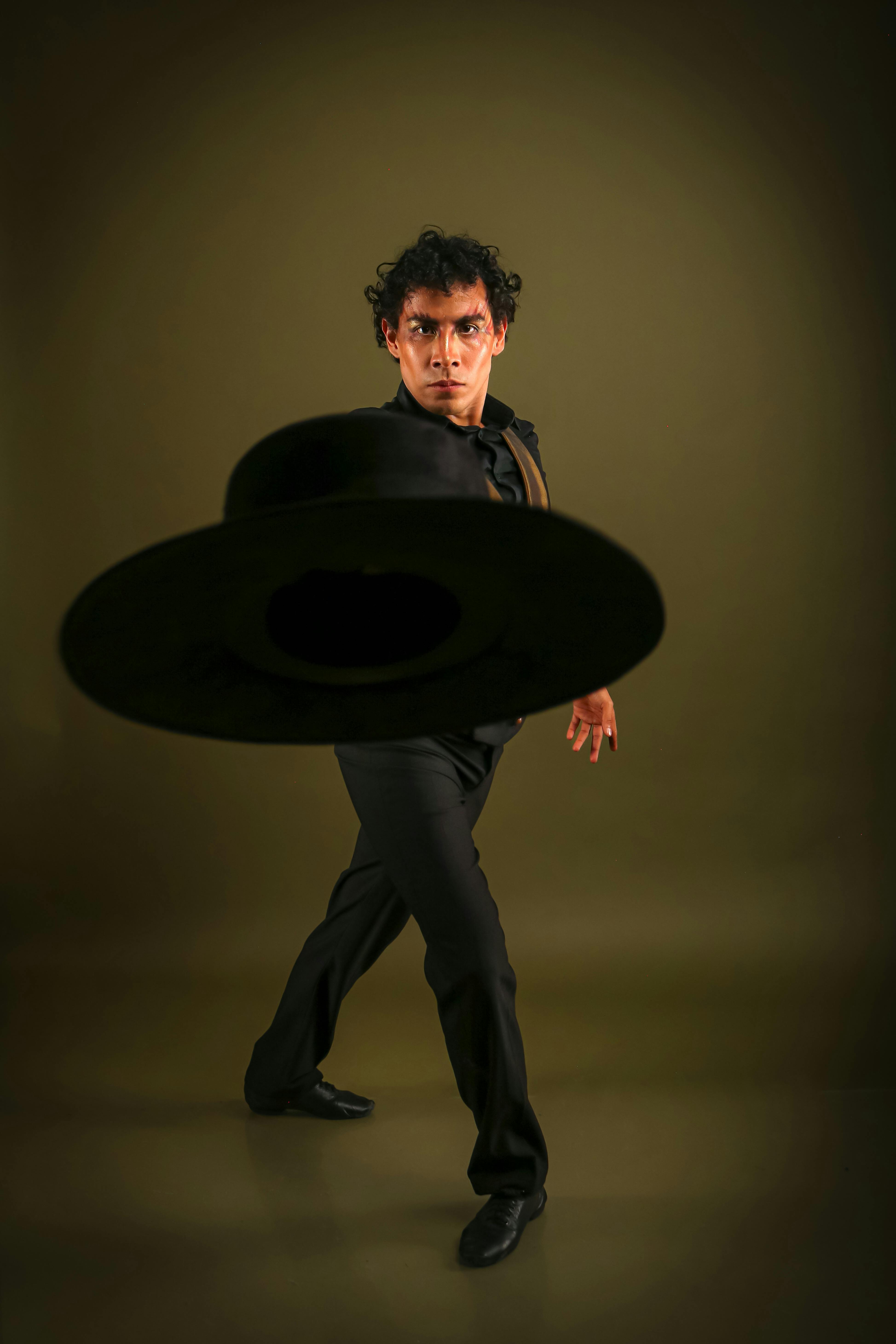 Dynamic Dance Performer in Action Pose · Free Stock Photo