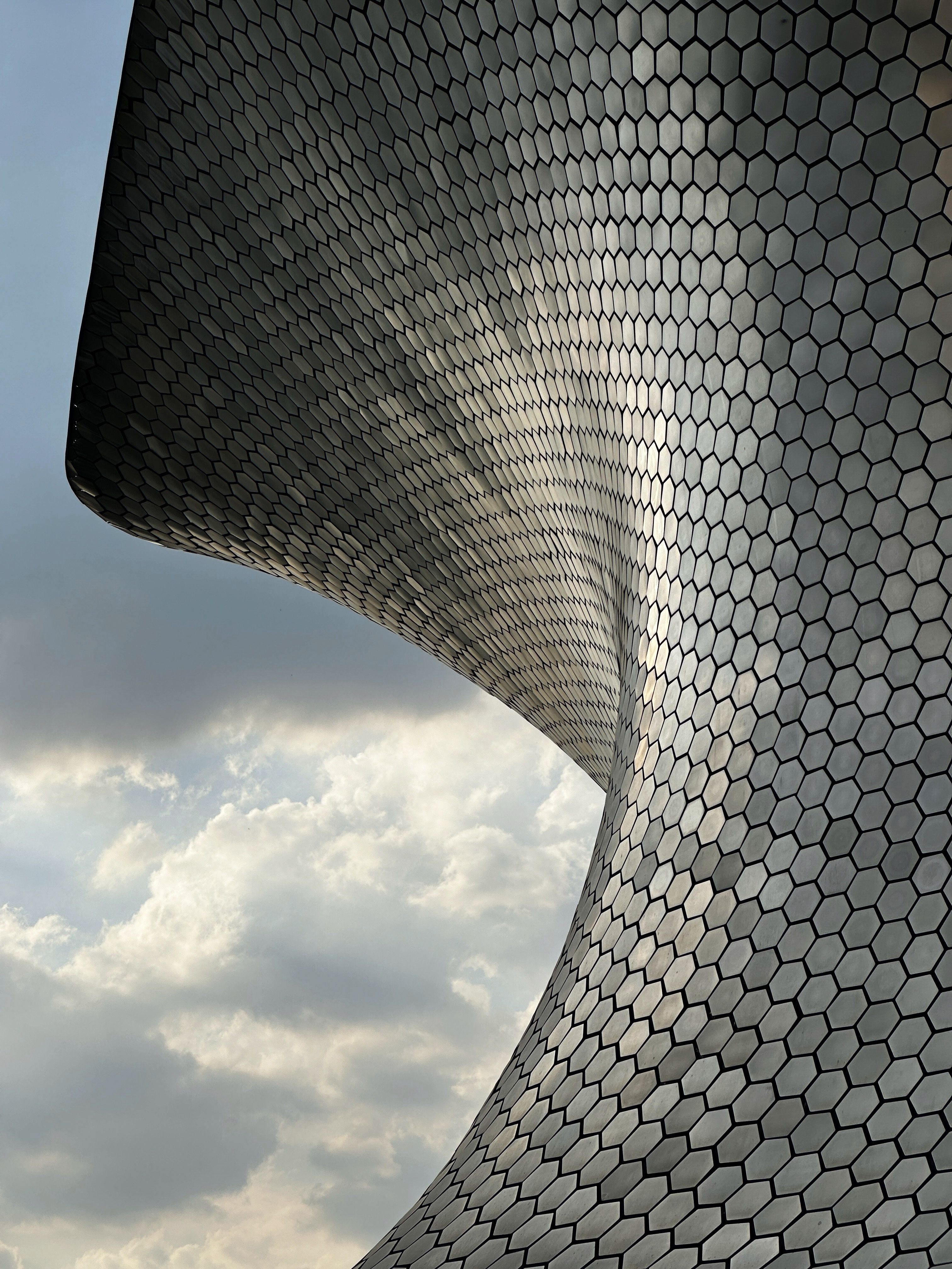 Modern Architecture with Metallic Honeycomb Design · Free Stock Photo