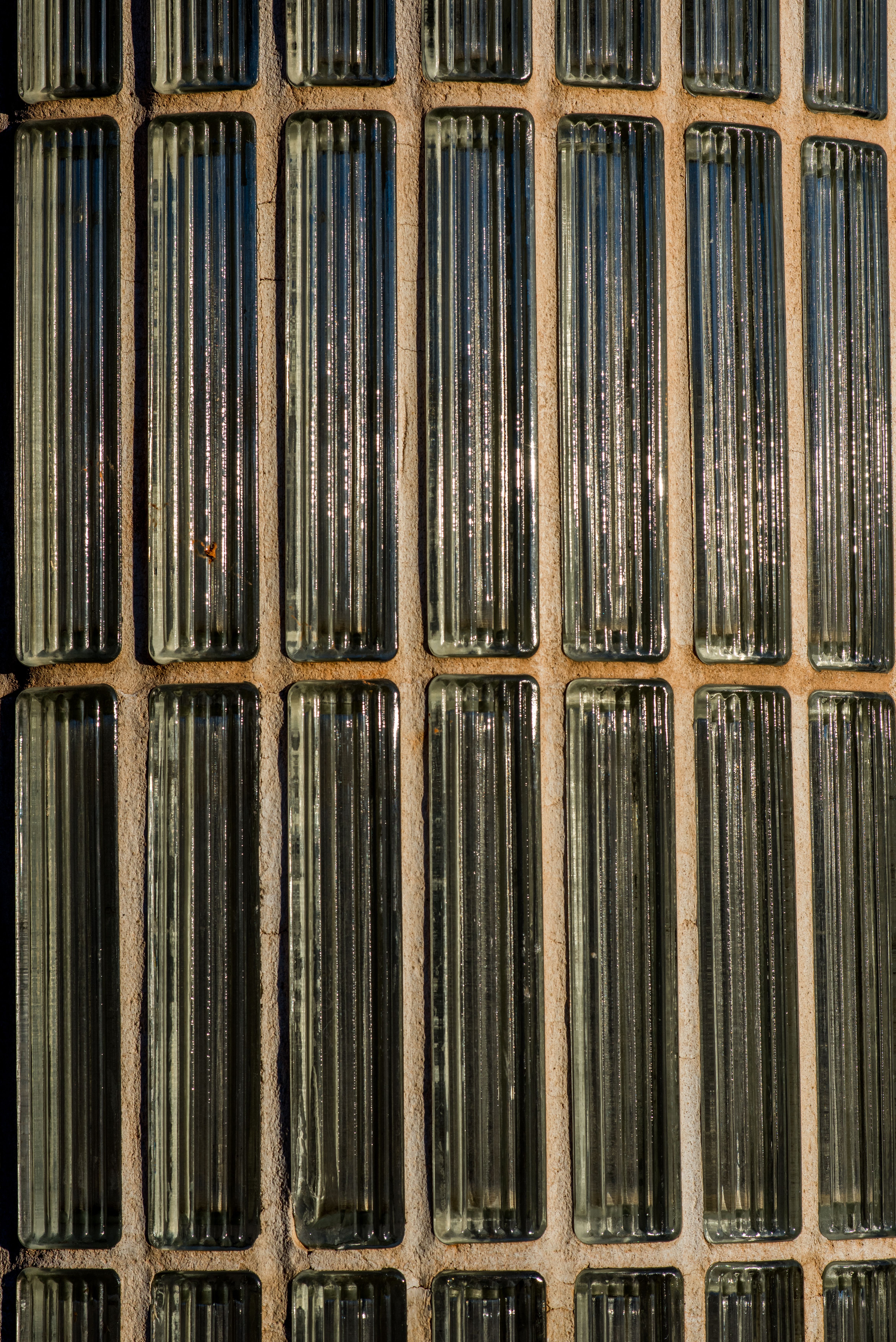 Textured Glass Blocks Wall with Vertical Lines · Free Stock Photo