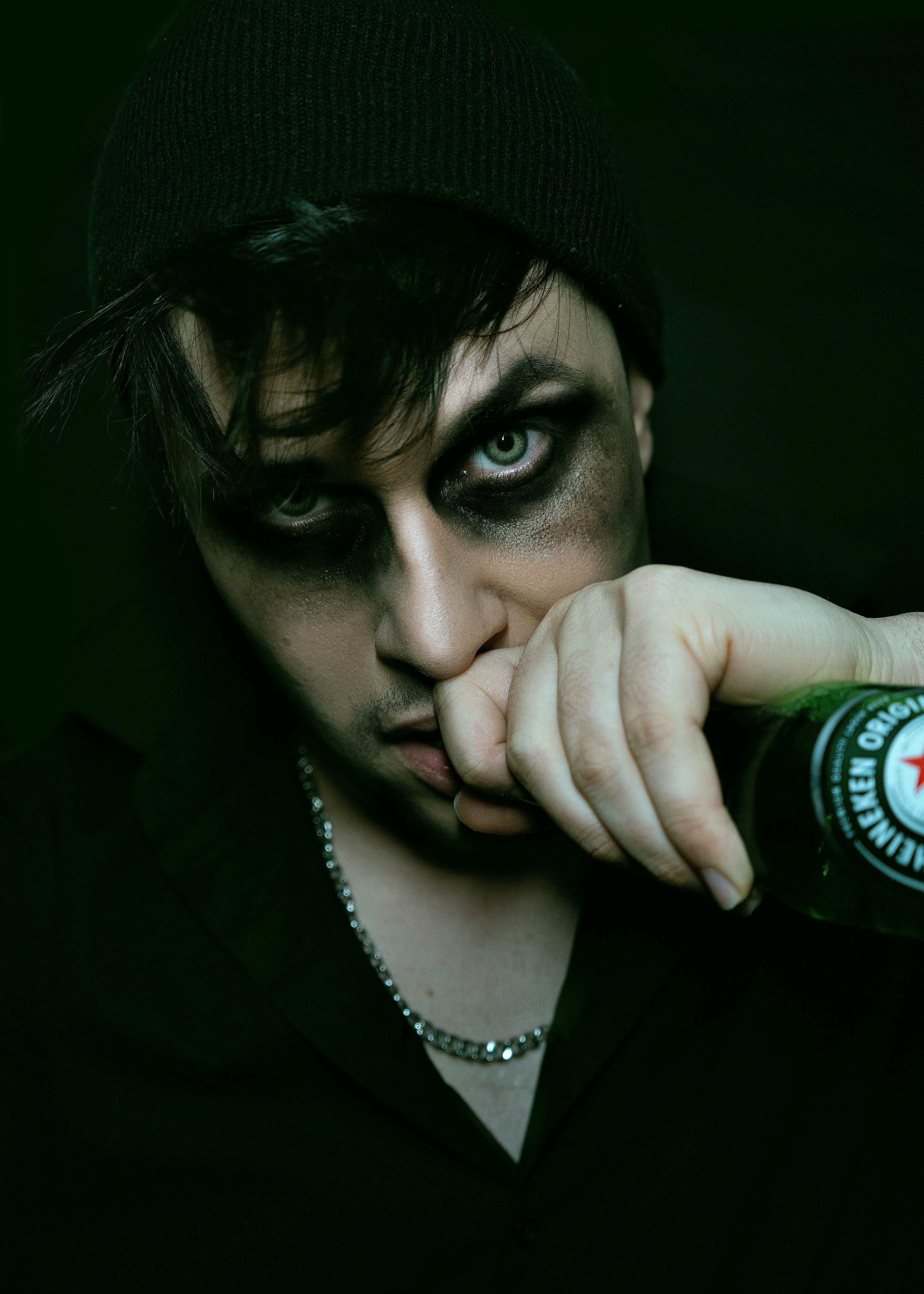 Moody Portrait of Man with Dramatic Makeup · Free Stock Photo