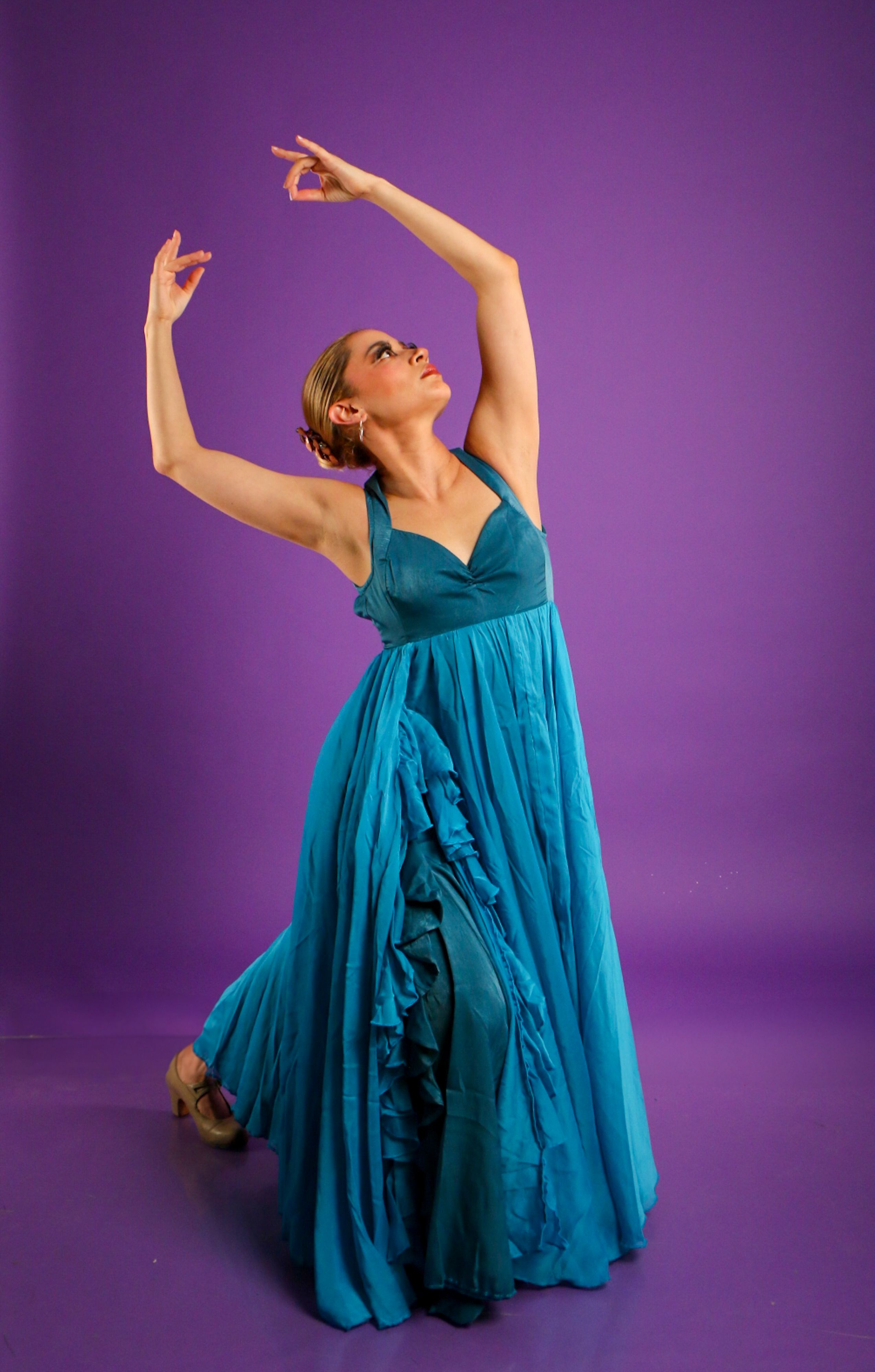Elegant Dance Pose in Flowing Blue Dress · Free Stock Photo
