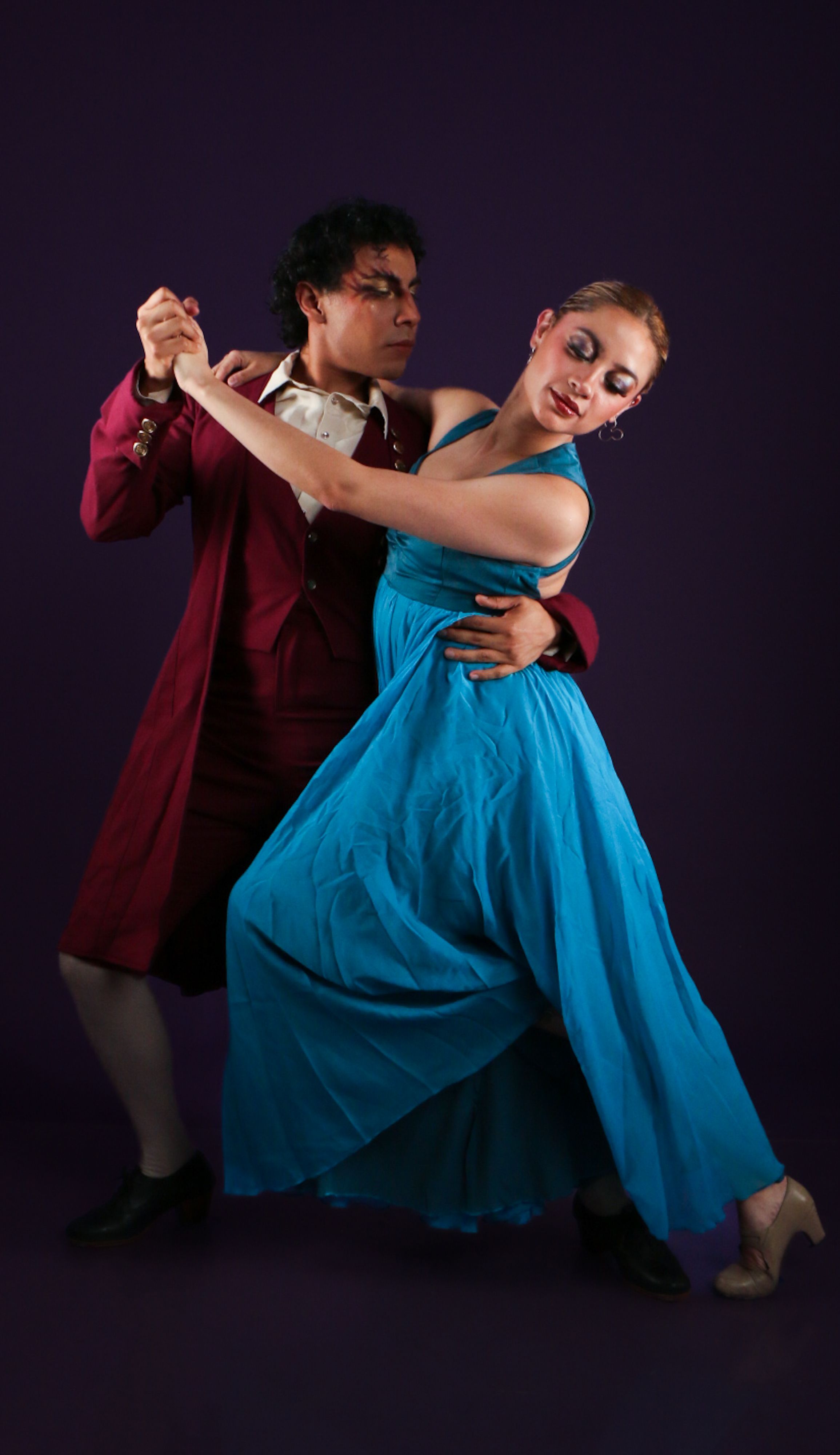 Elegant Couple Performing Passionate Dance · Free Stock Photo