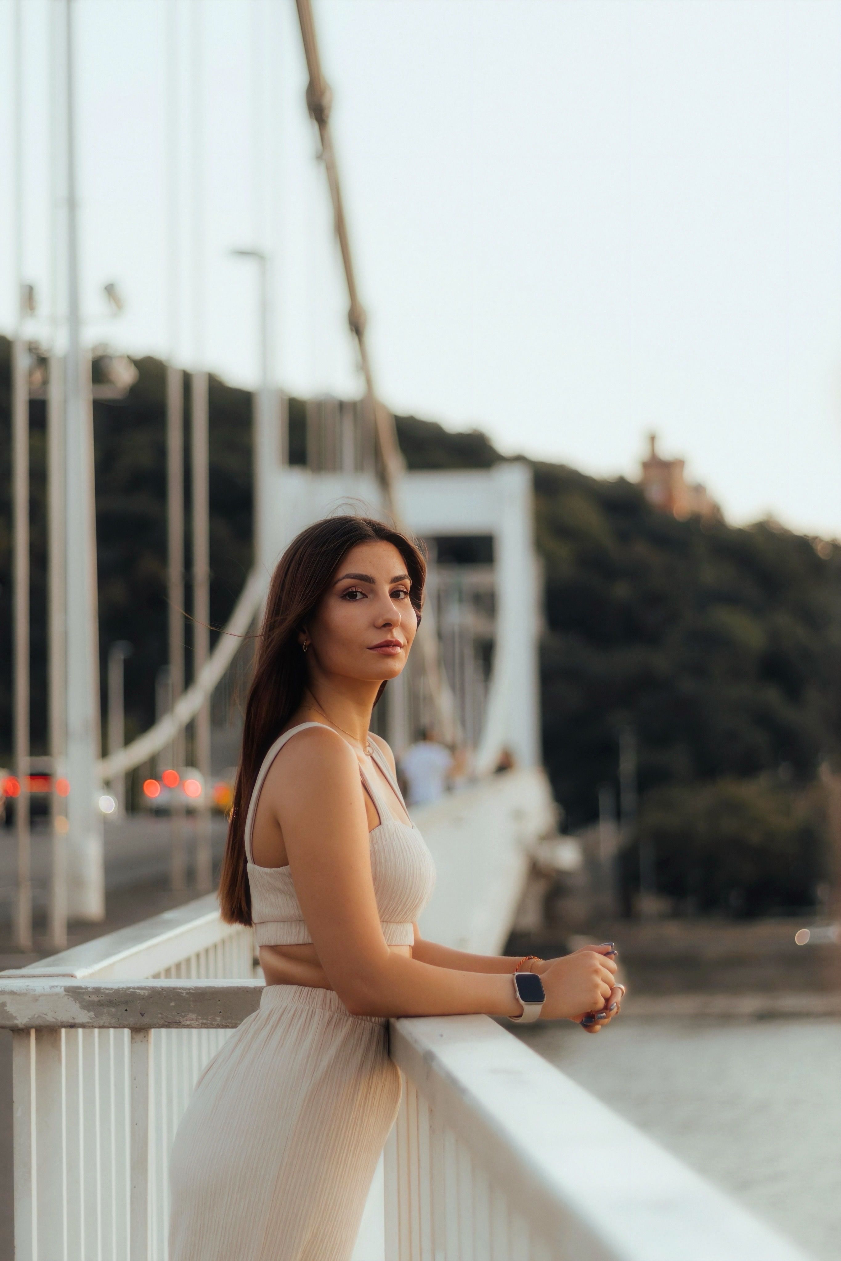 Woman on Bridge at Sunset with Soft Light · Free Stock Photo