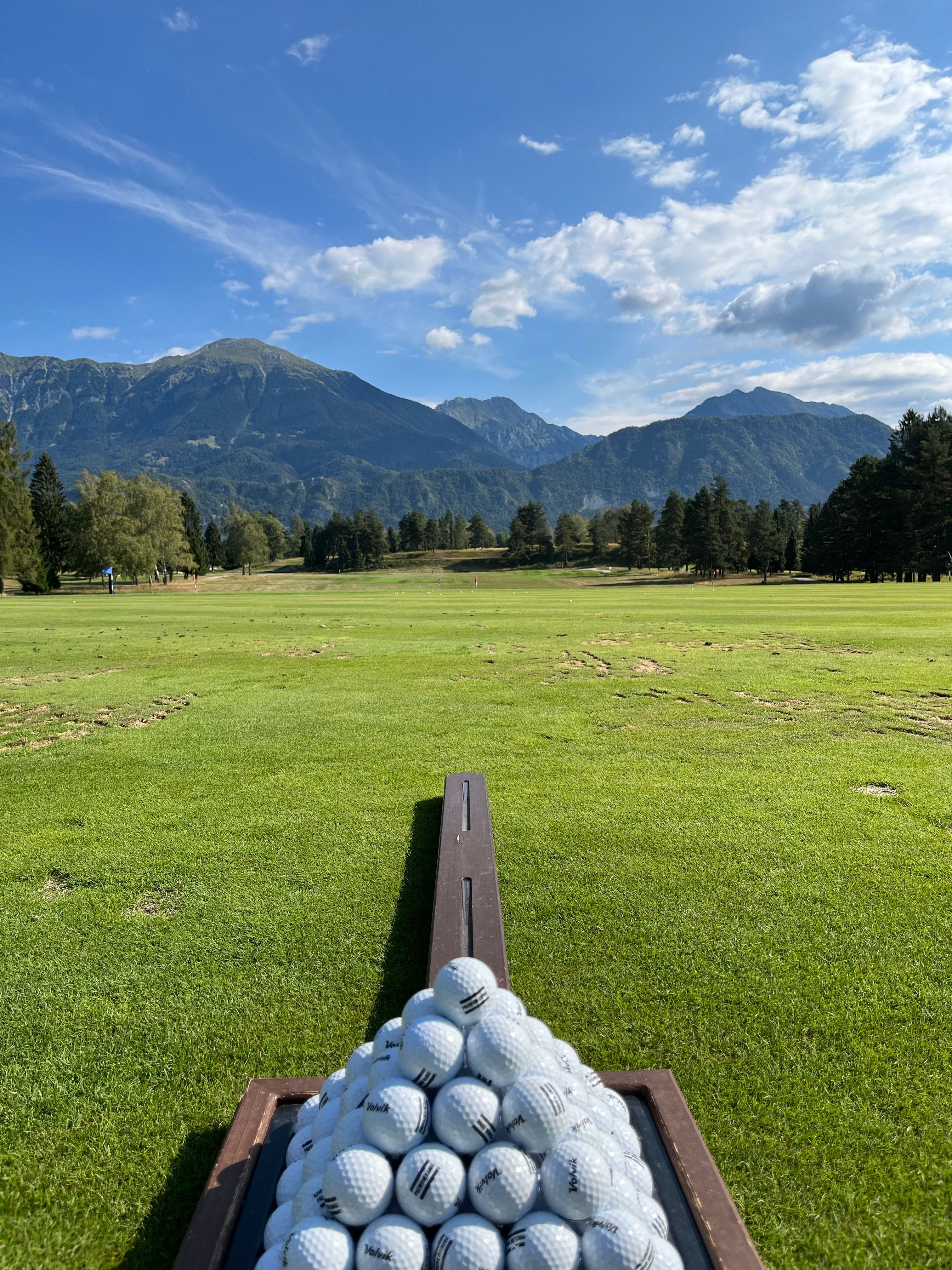 Golf Course View with Mountains in Jesenice · Free Stock Photo