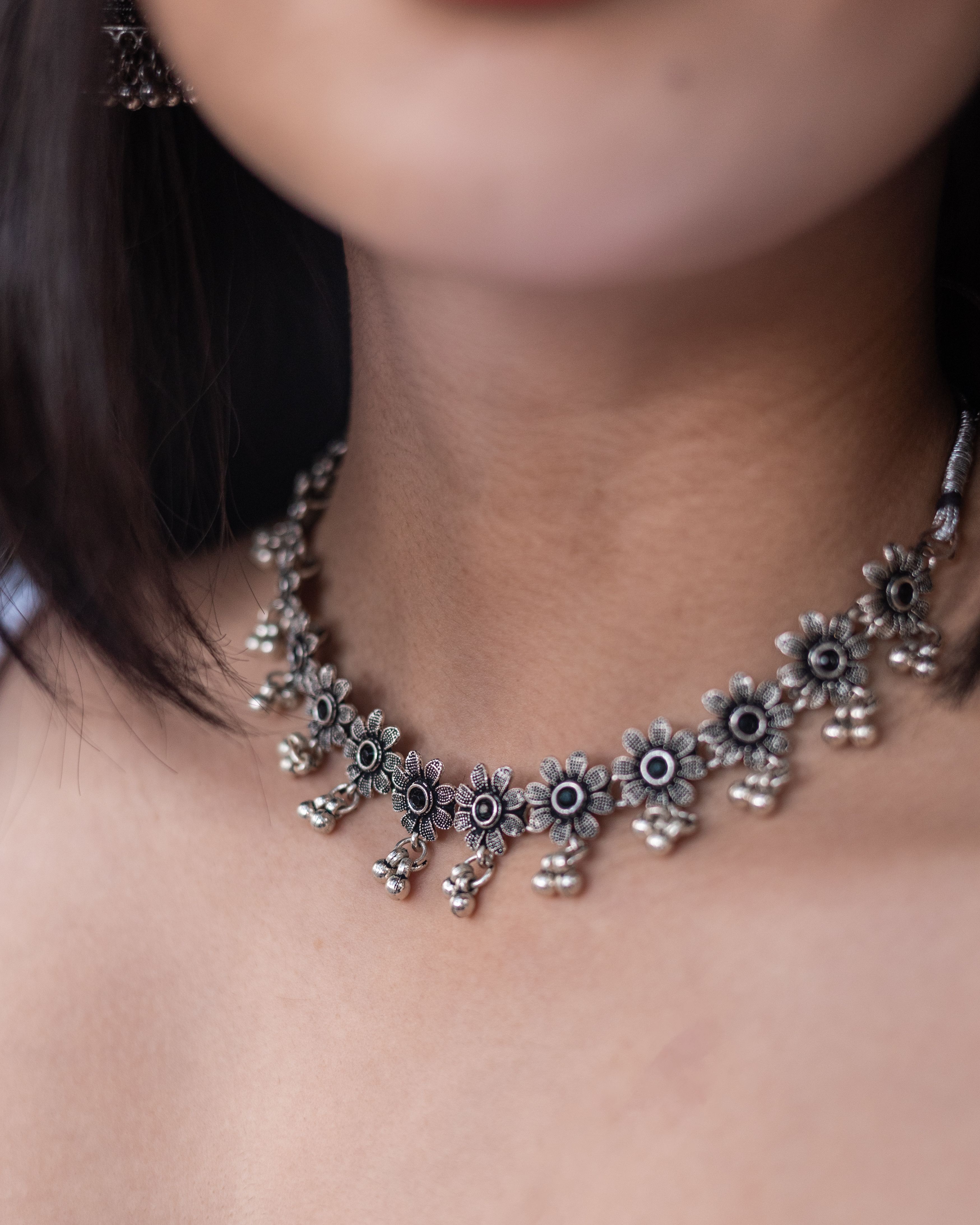 Elegant Floral Choker with Silver Detailing · Free Stock Photo