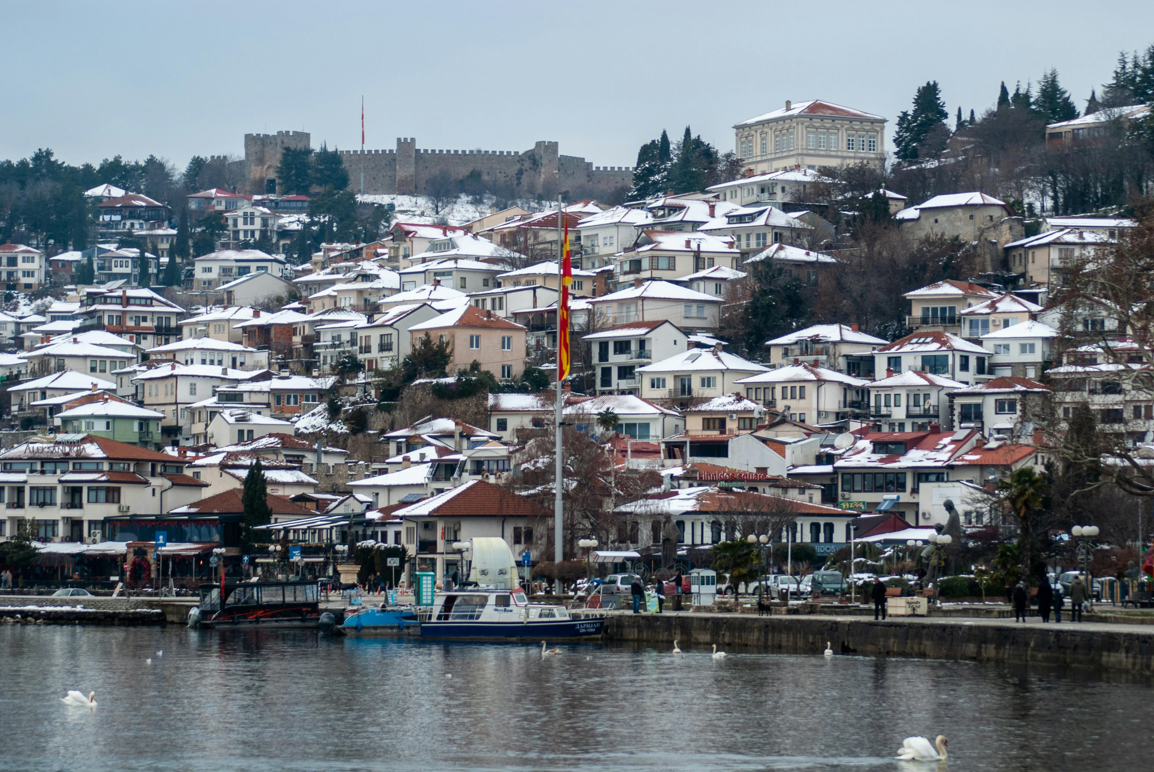 Snowy Ohrid Architecture Reflecting in Lake · Free Stock Photo