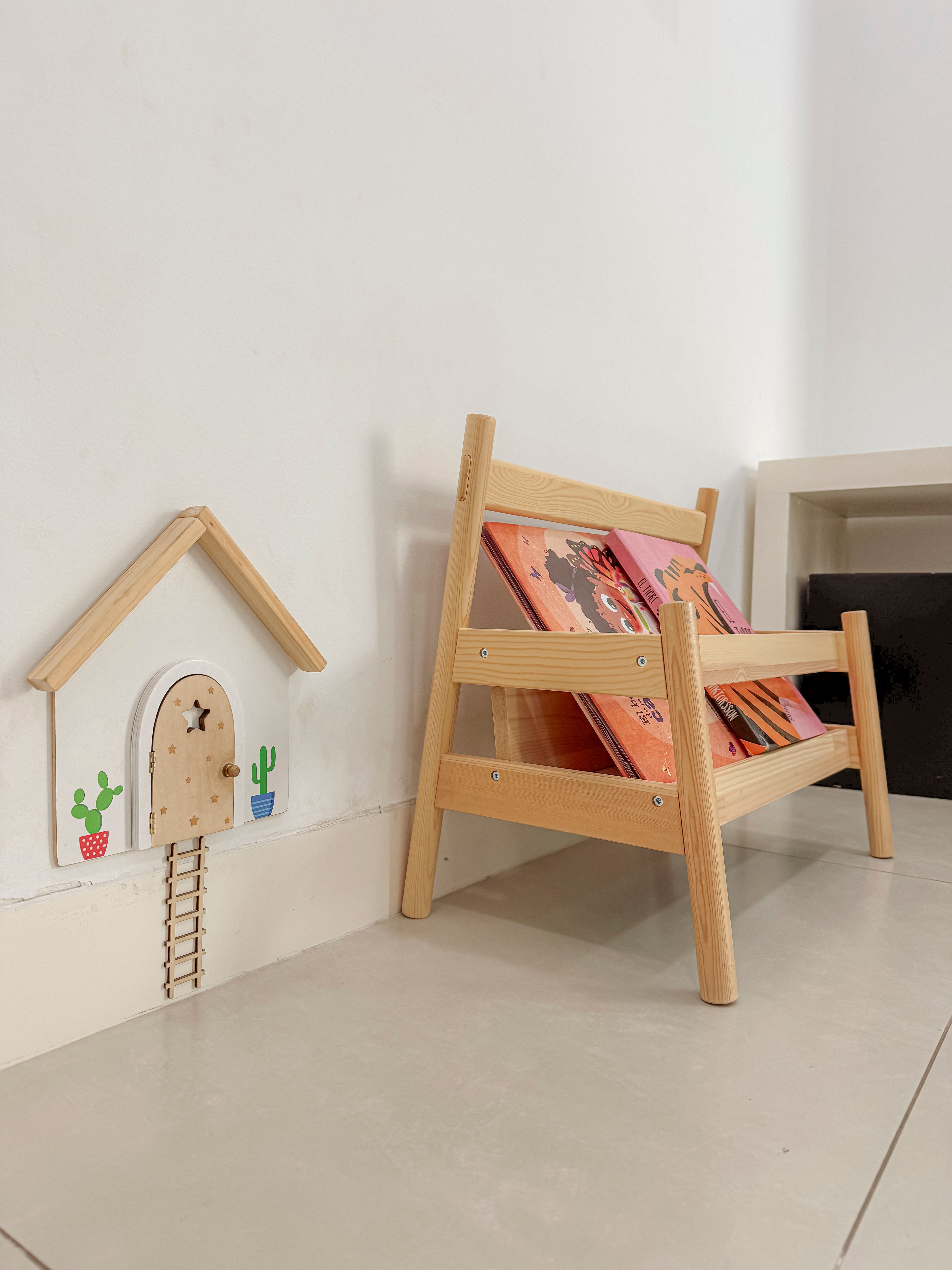 Cozy Children's Book Corner with Wooden Shelf · Free Stock Photo