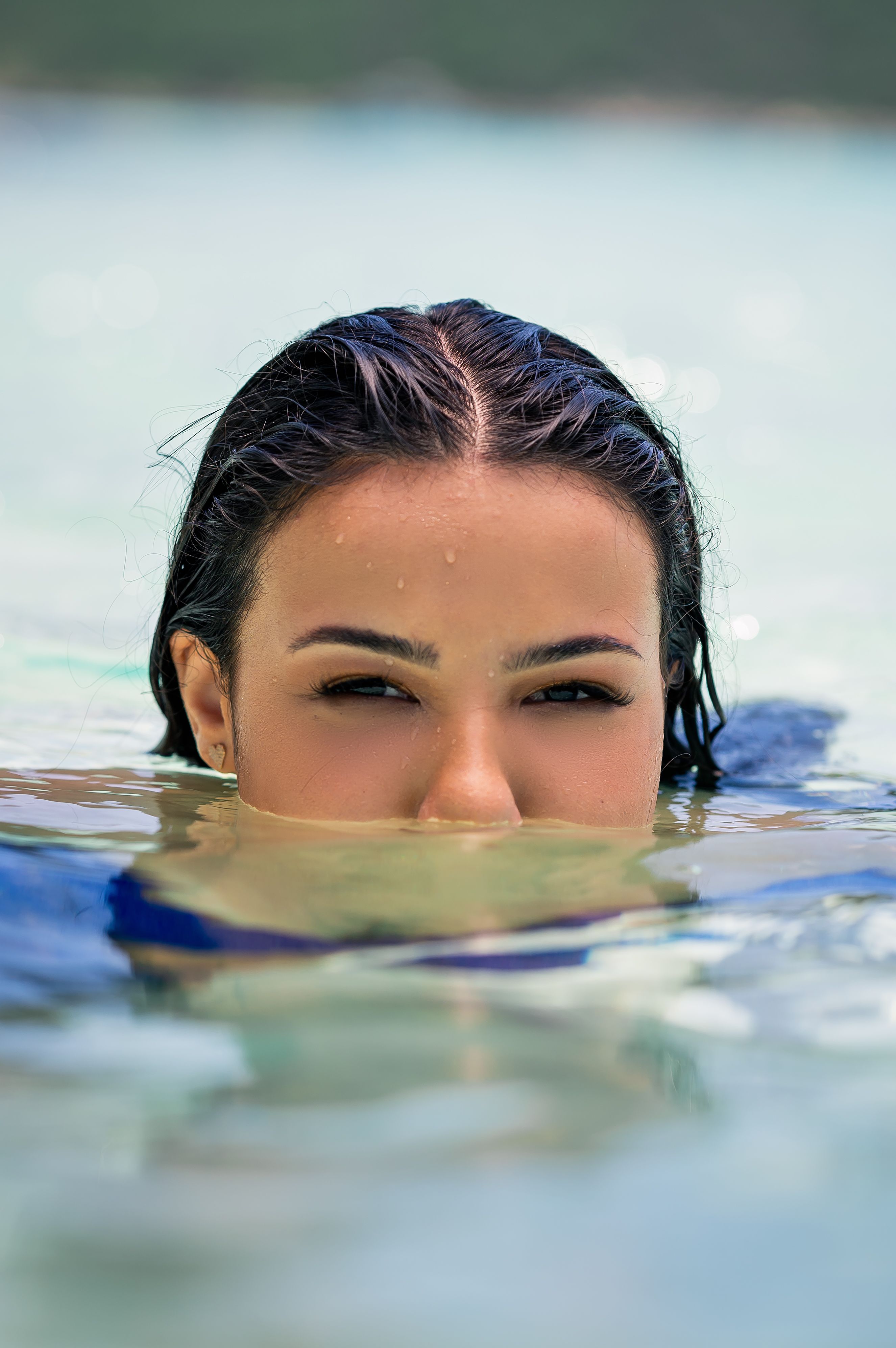 Portrait of Woman Emerging from Water in Tropical Setting · Free Stock ...
