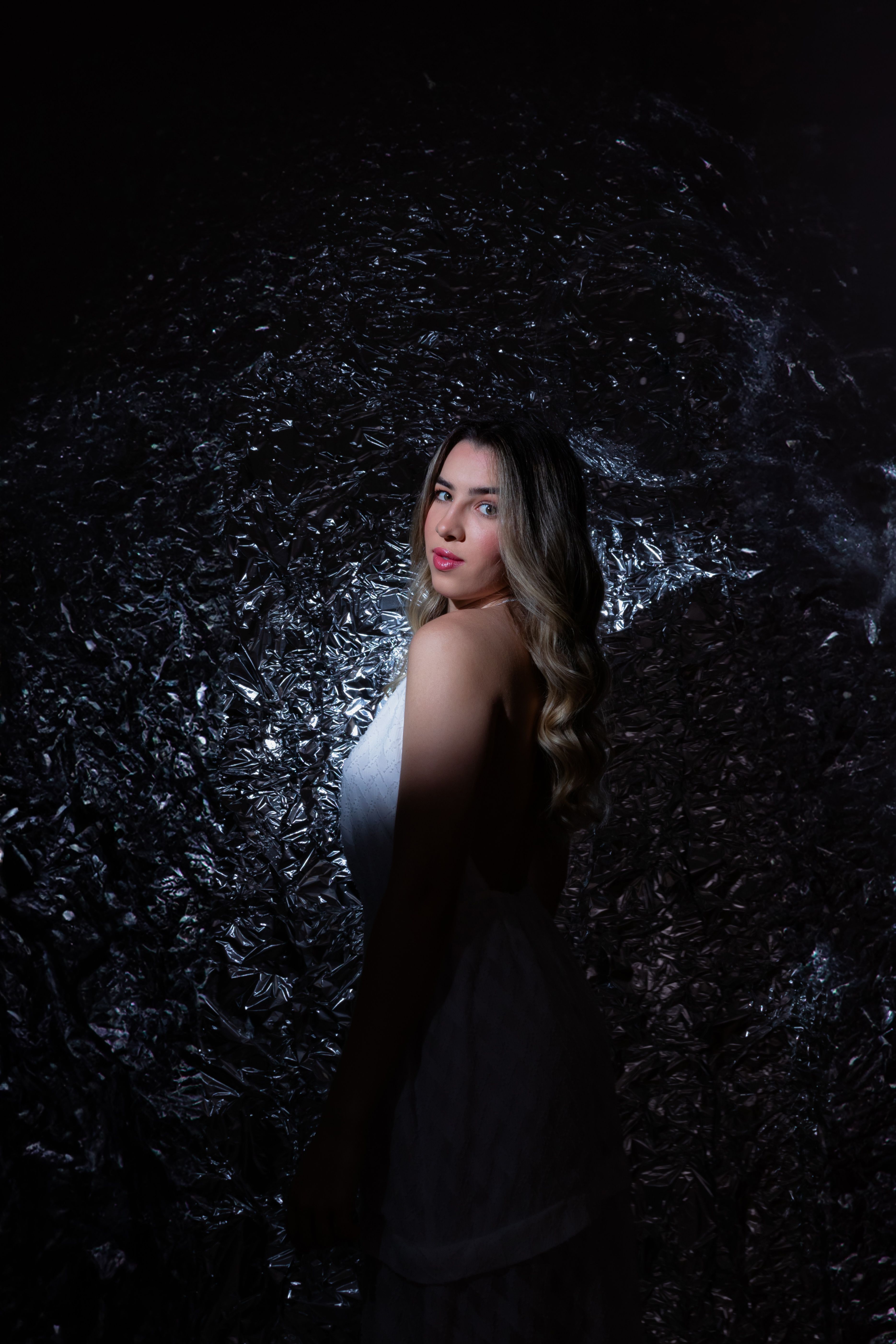 Dramatic Portrait of a Woman in Low Light · Free Stock Photo