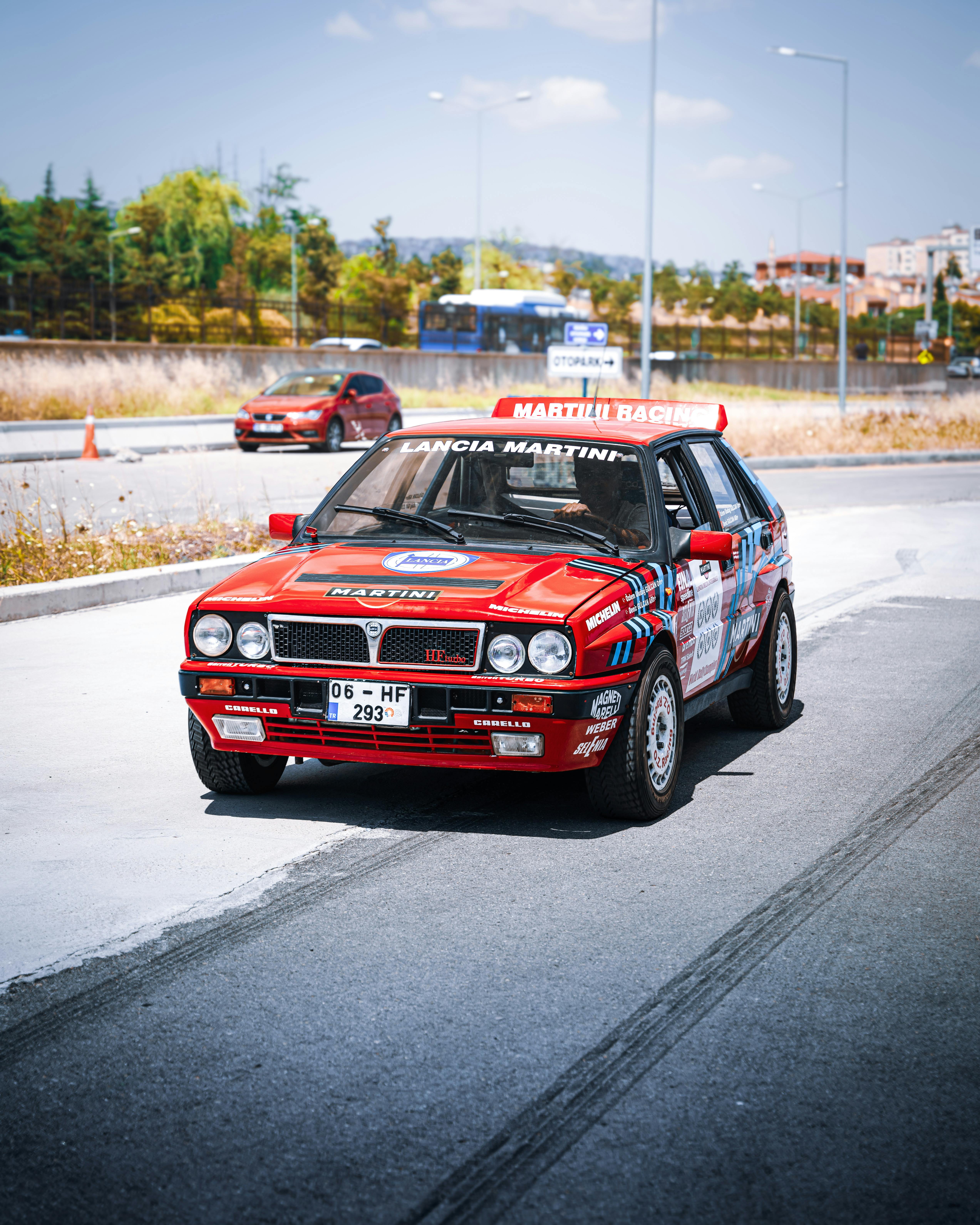 Vintage Lancia Rally Car on Sunny Day · Free Stock Photo