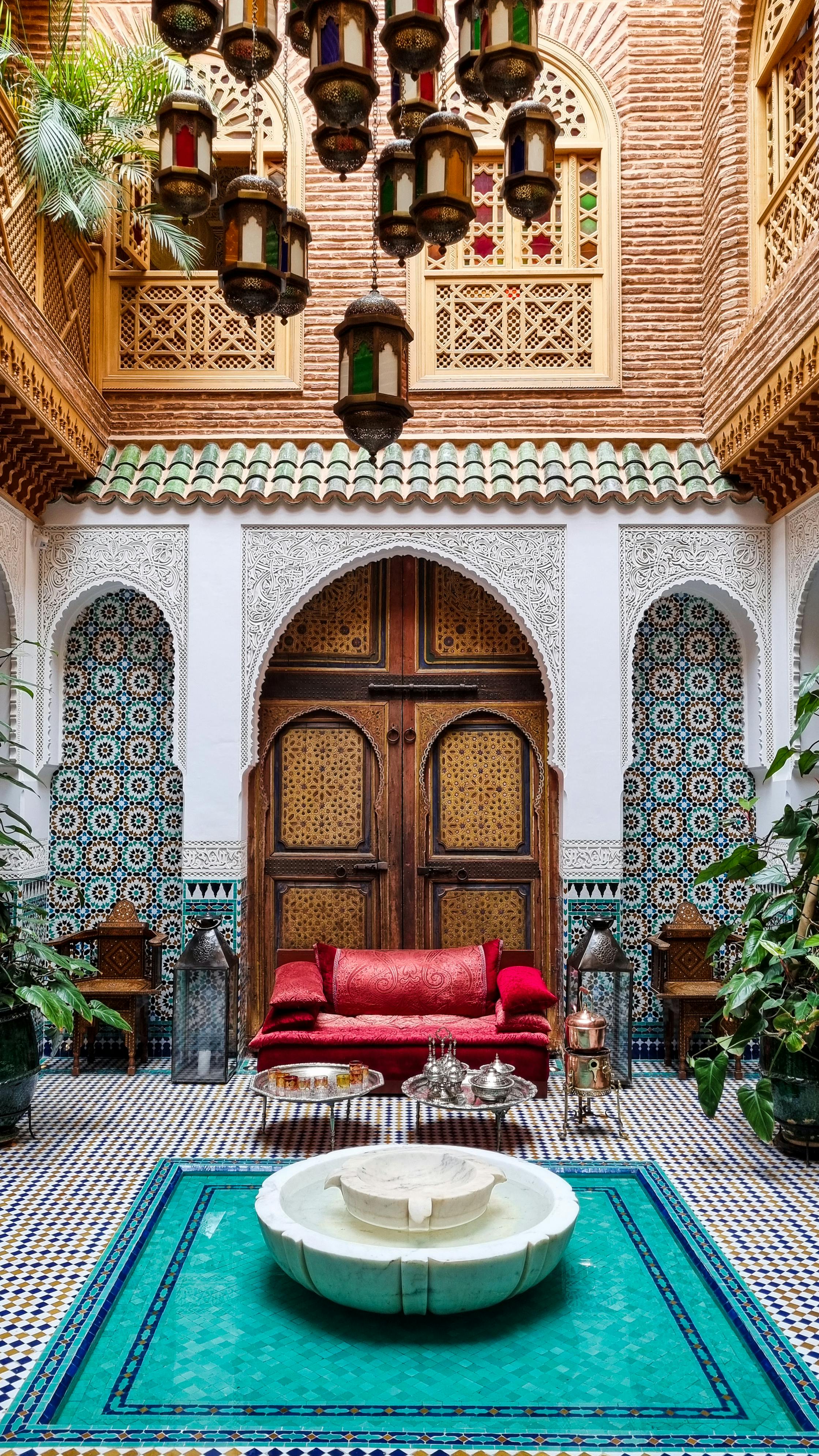 Elegant Moroccan Riad Interior with Fountain · Free Stock Photo