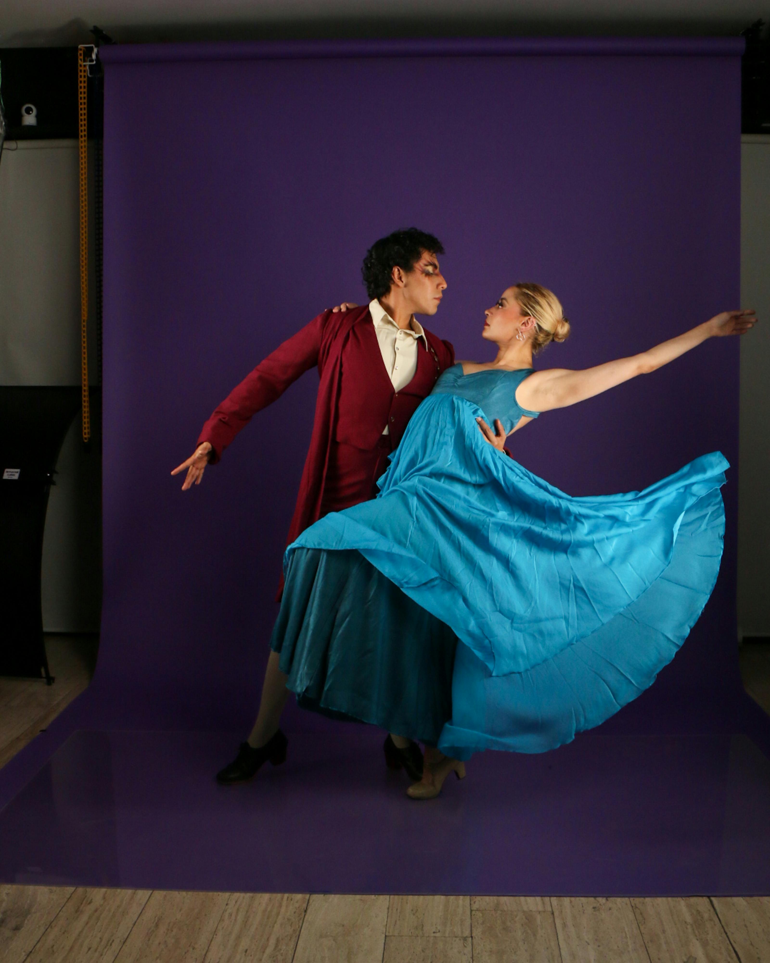 Elegant Dance Duo in Colorful Performance · Free Stock Photo