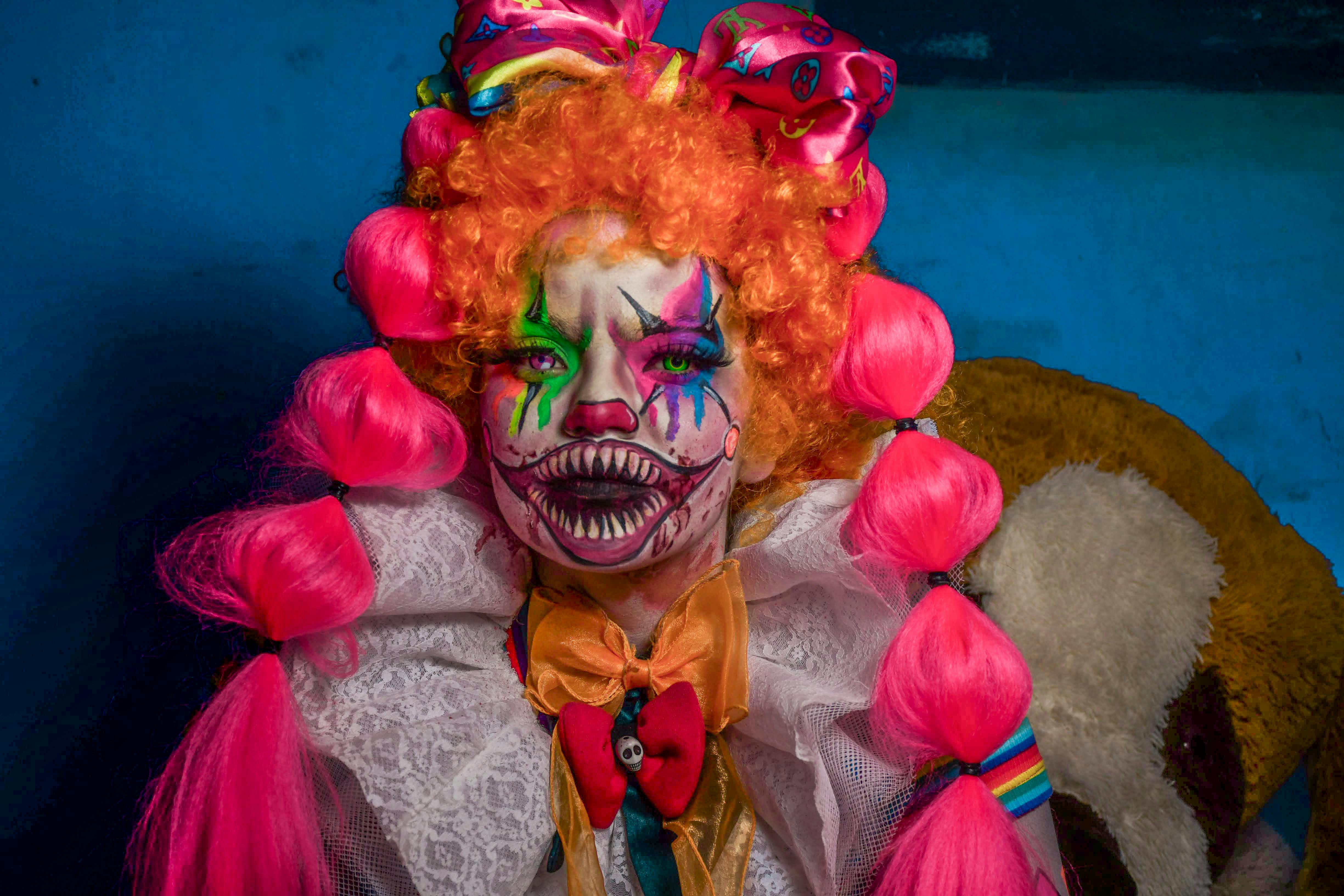 Colorful Clown Portrait with Vibrant Makeup · Free Stock Photo