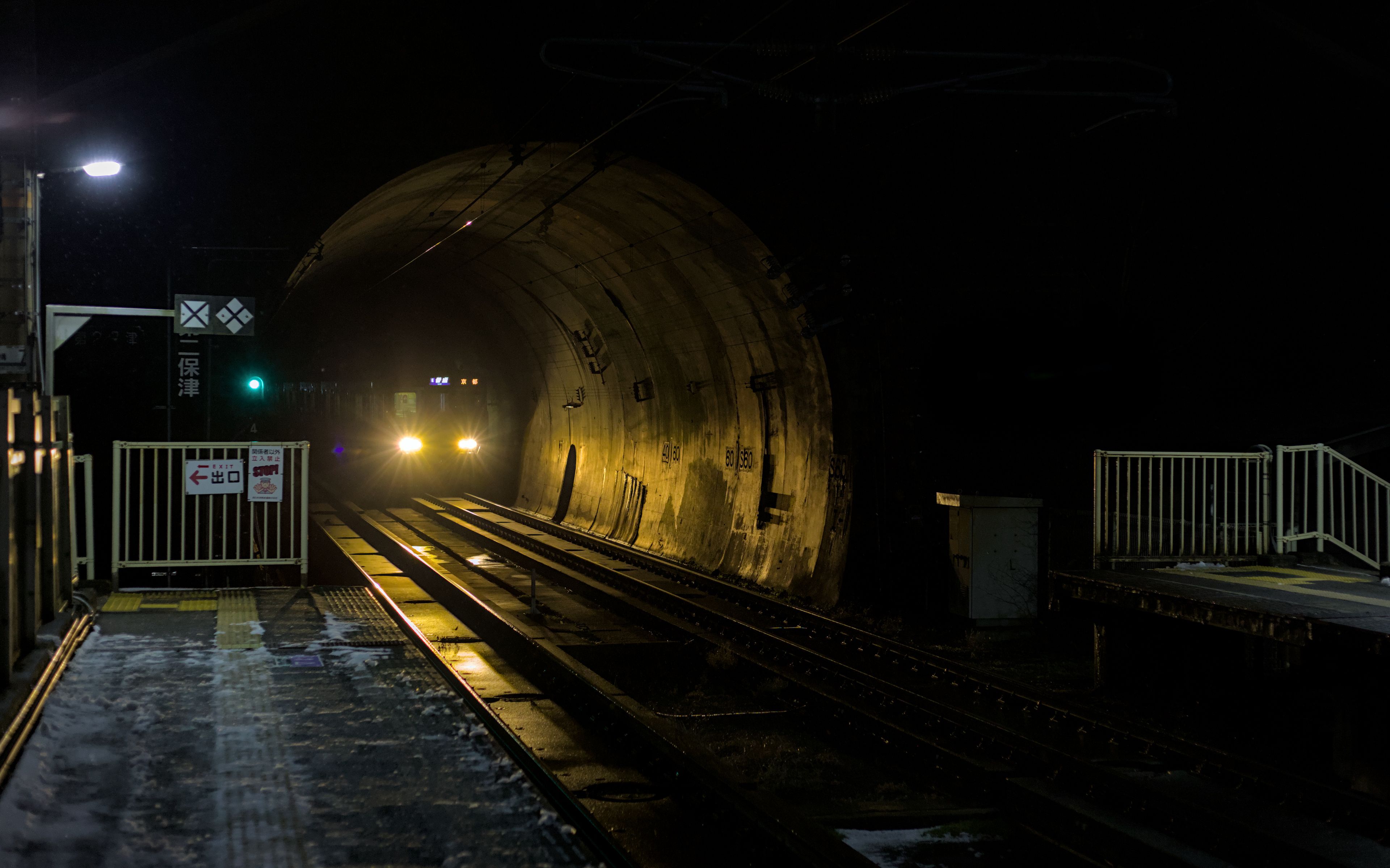 Night Train Approaching Hozukyō Station in Winter · Free Stock Photo