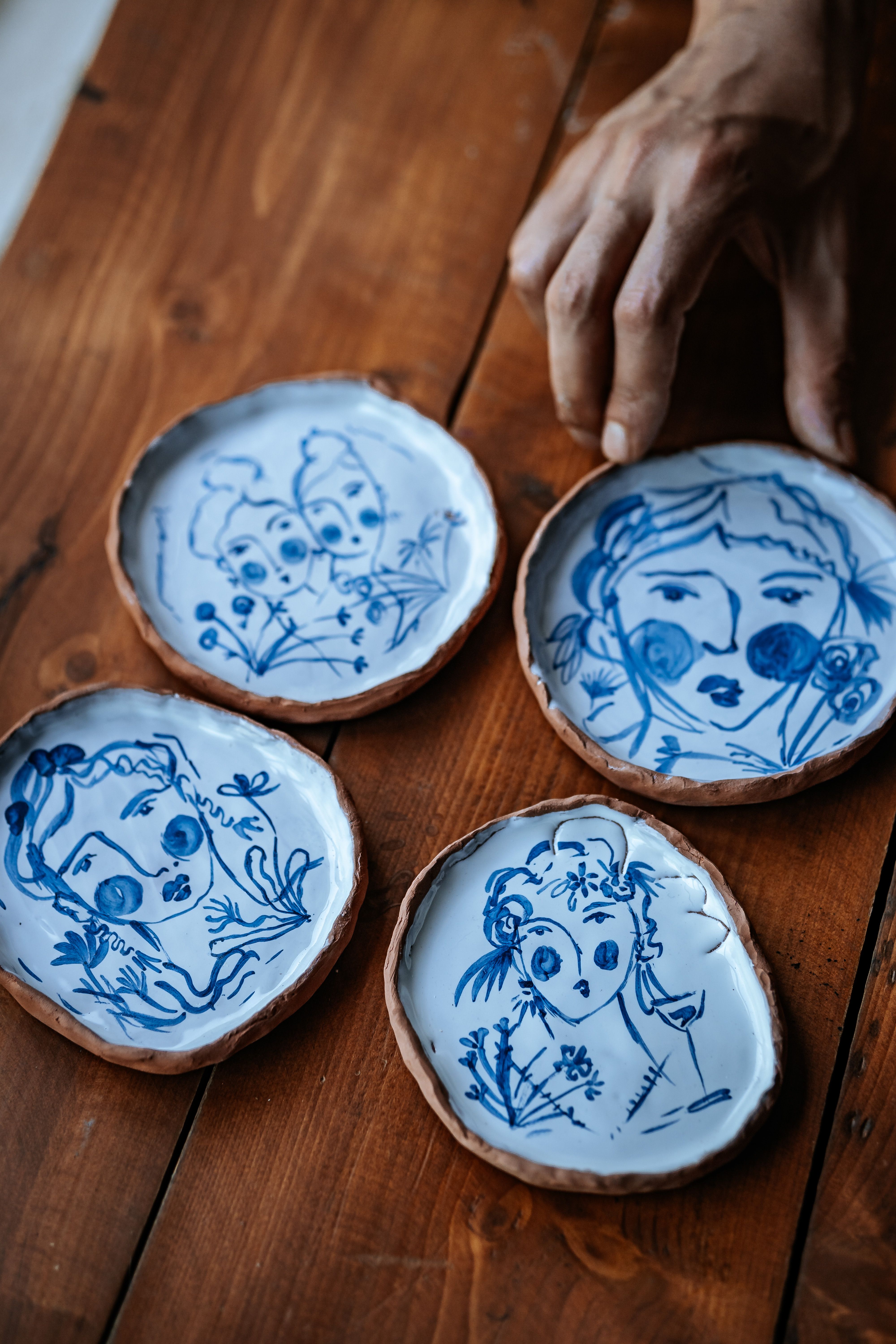 Handcrafted Ceramic Plates with Artistic Designs · Free Stock Photo