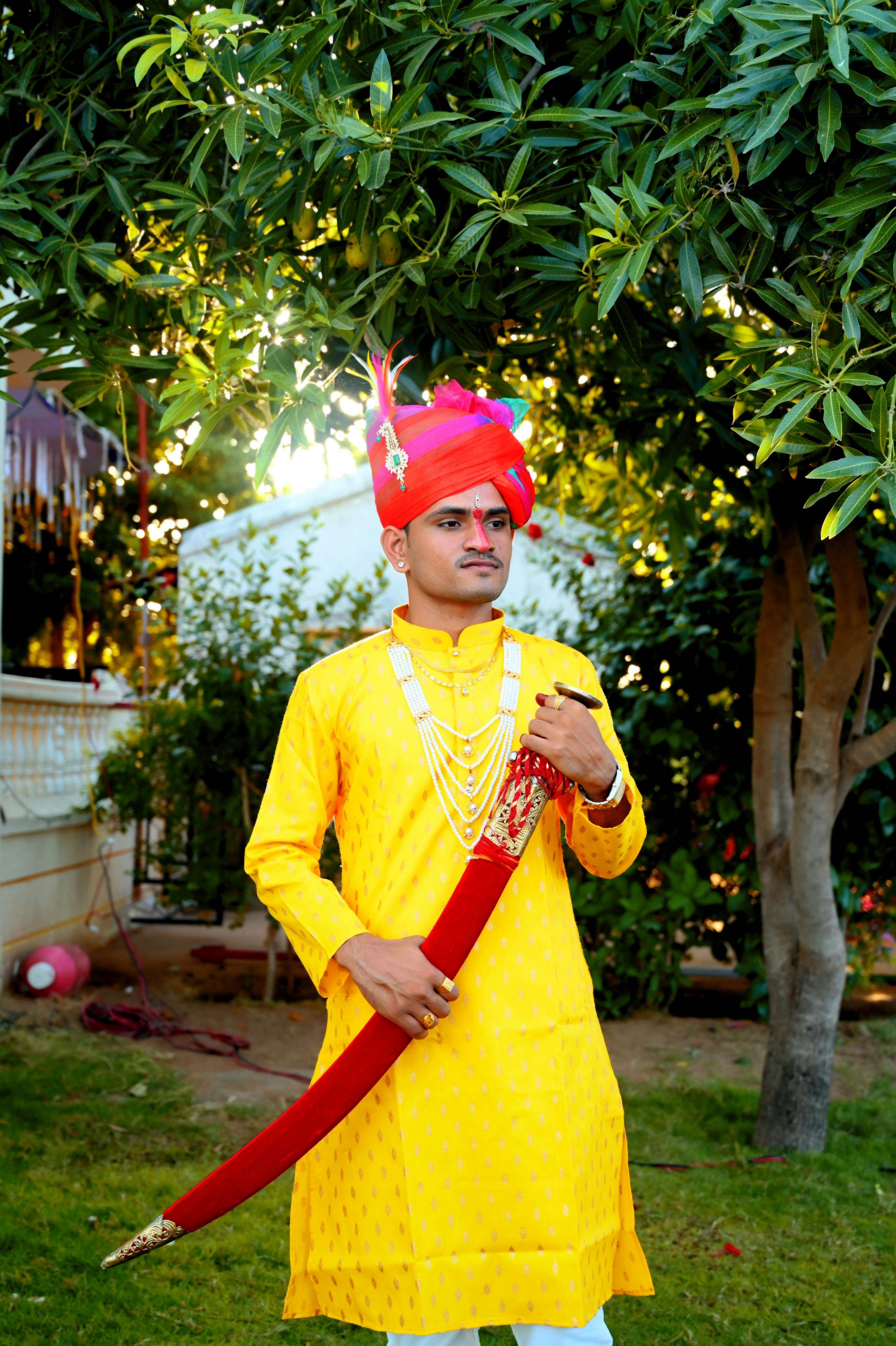 Traditional Rajput Groom in Vibrant Attire · Free Stock Photo