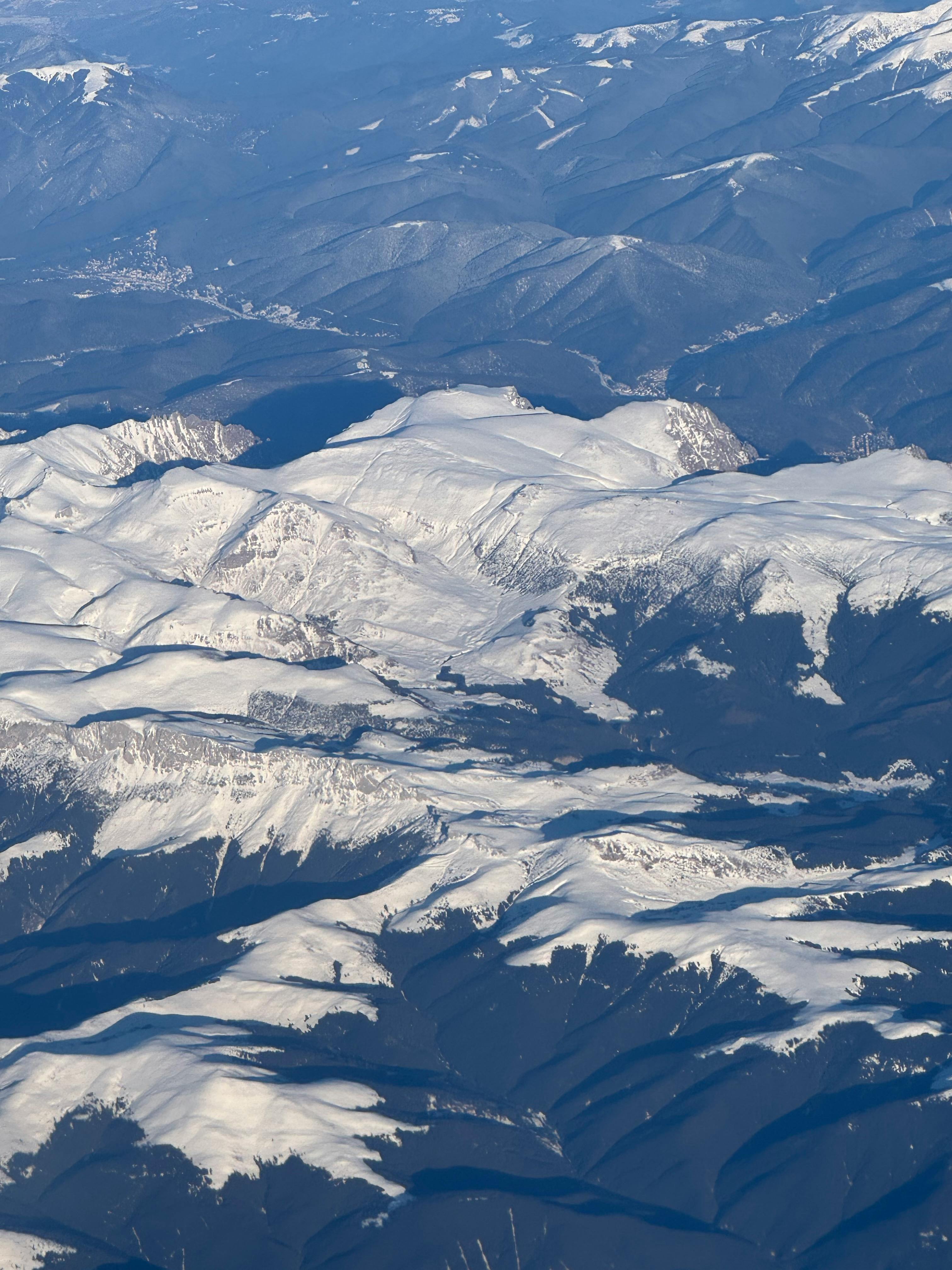 Aerial View of the Snow-Covered Transylvanian Alps · Free Stock Photo