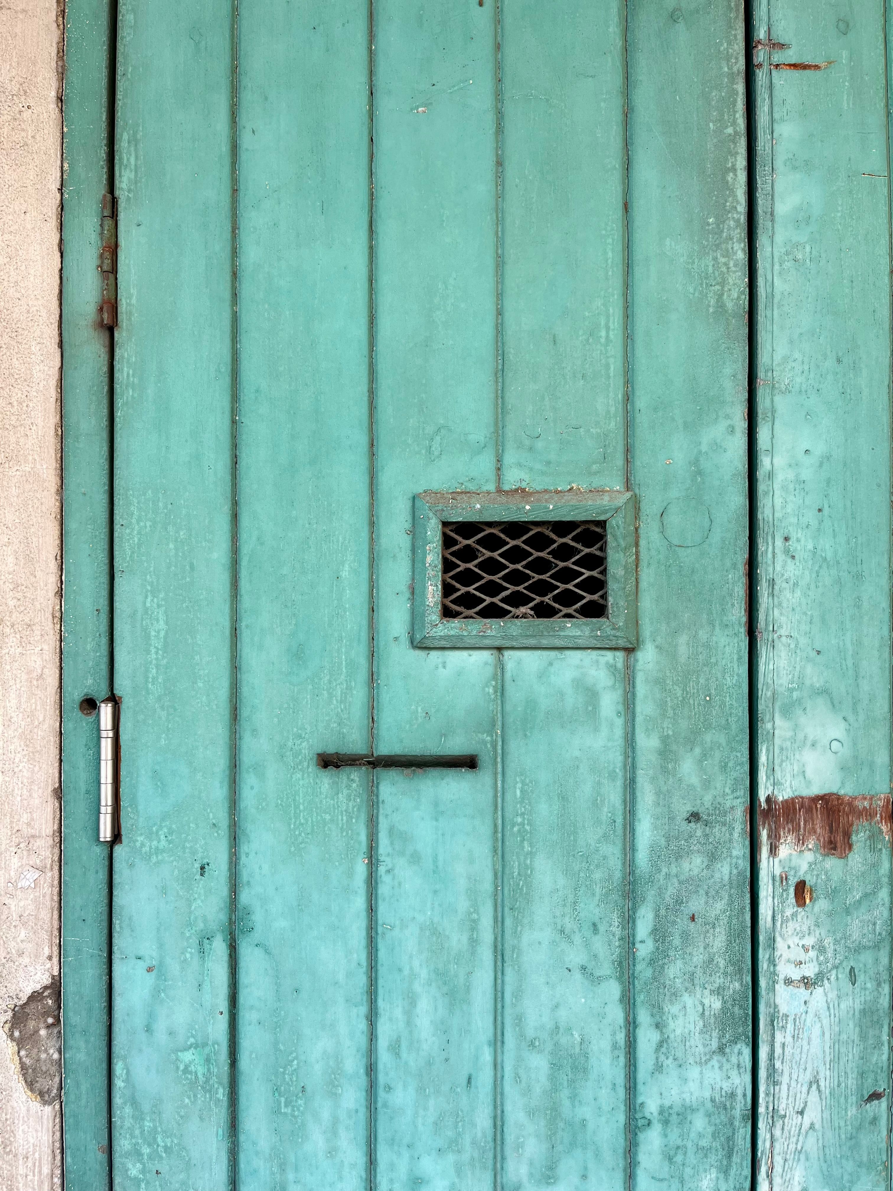 Rustic Teal Wooden Door with Grate · Free Stock Photo