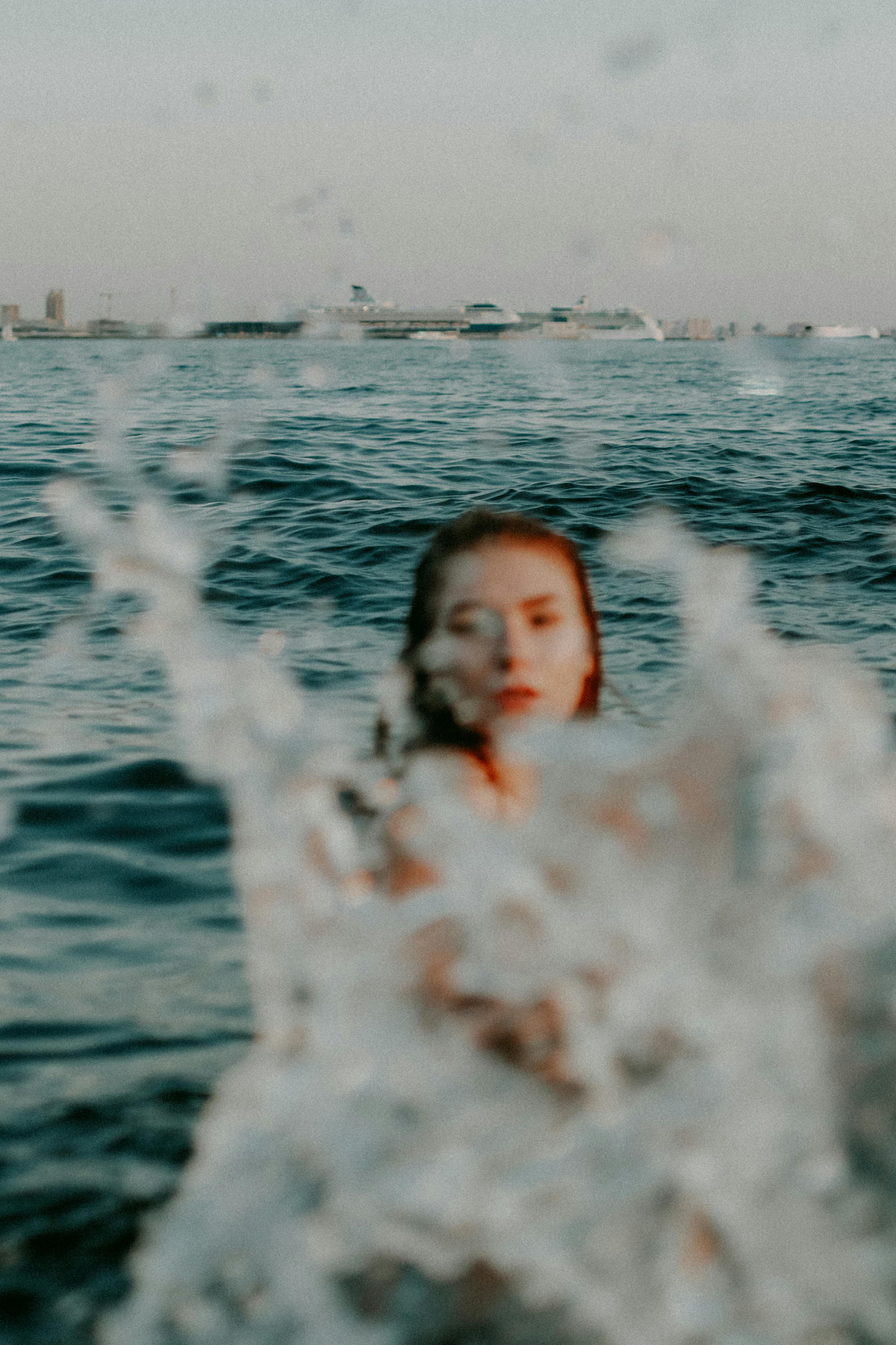 Woman on Body of Water Photo · Free Stock Photo