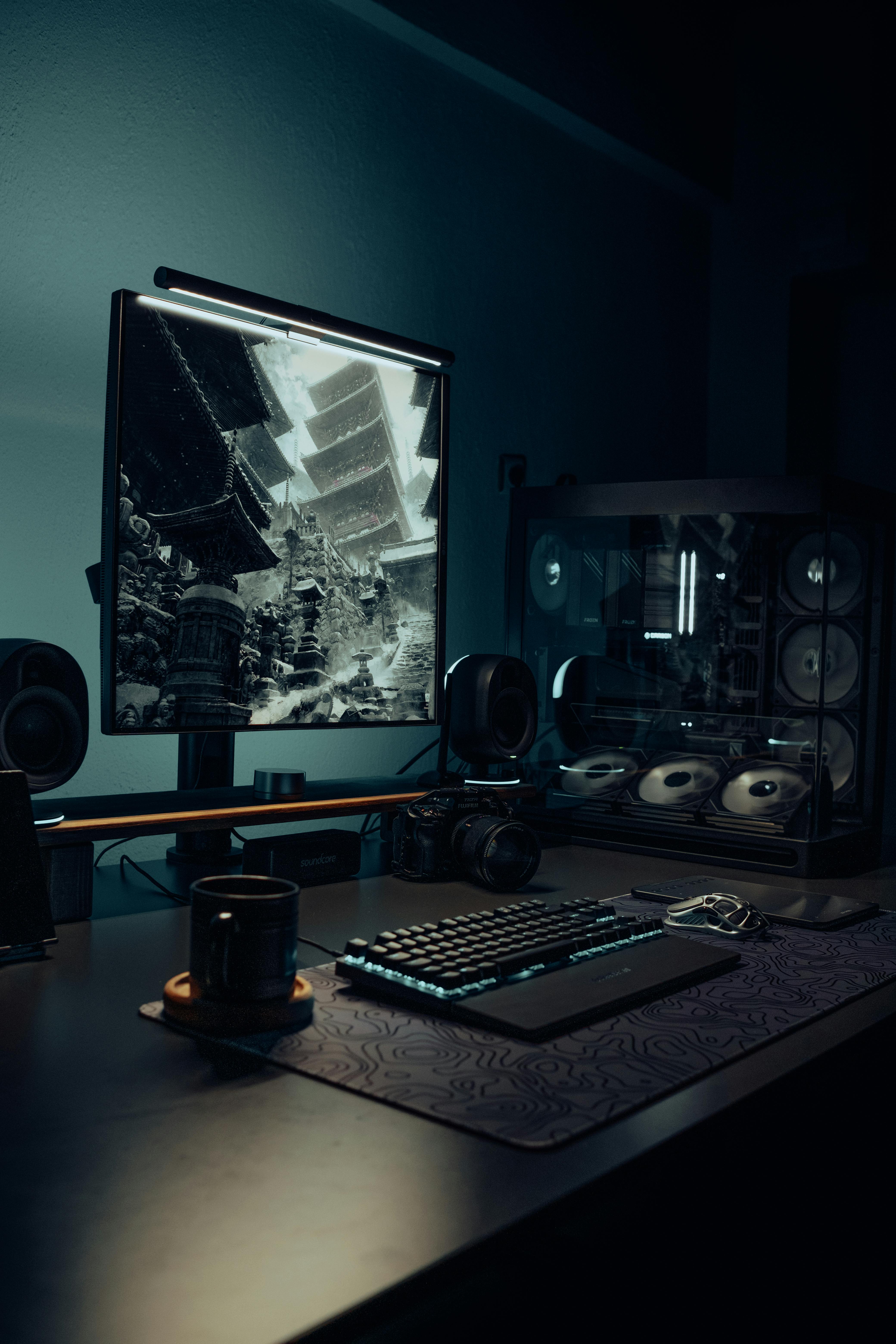 Modern Gaming Setup with Asian Themed Display · Free Stock Photo