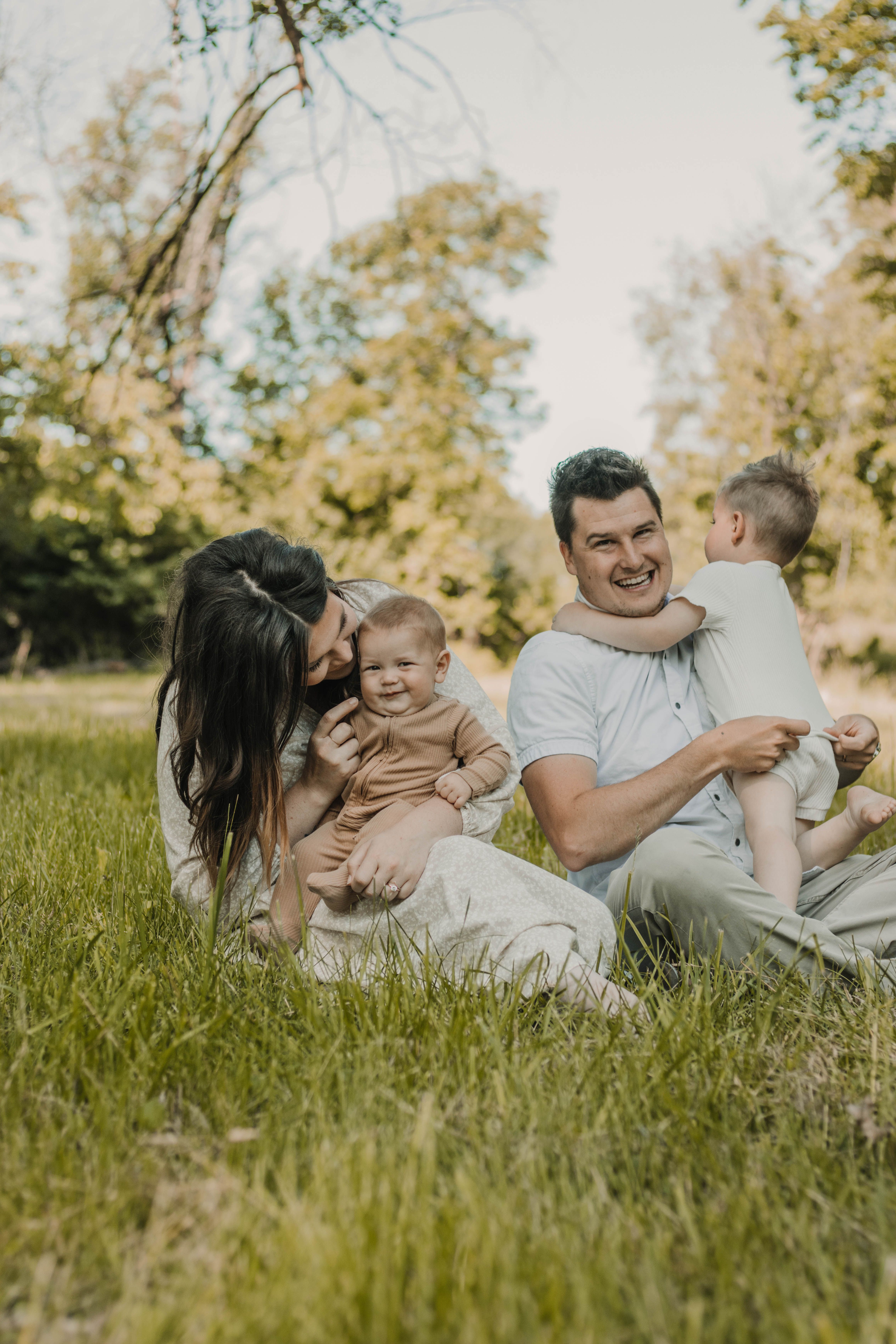 Happy Family Enjoying Outdoor Time in Nature · Free Stock Photo