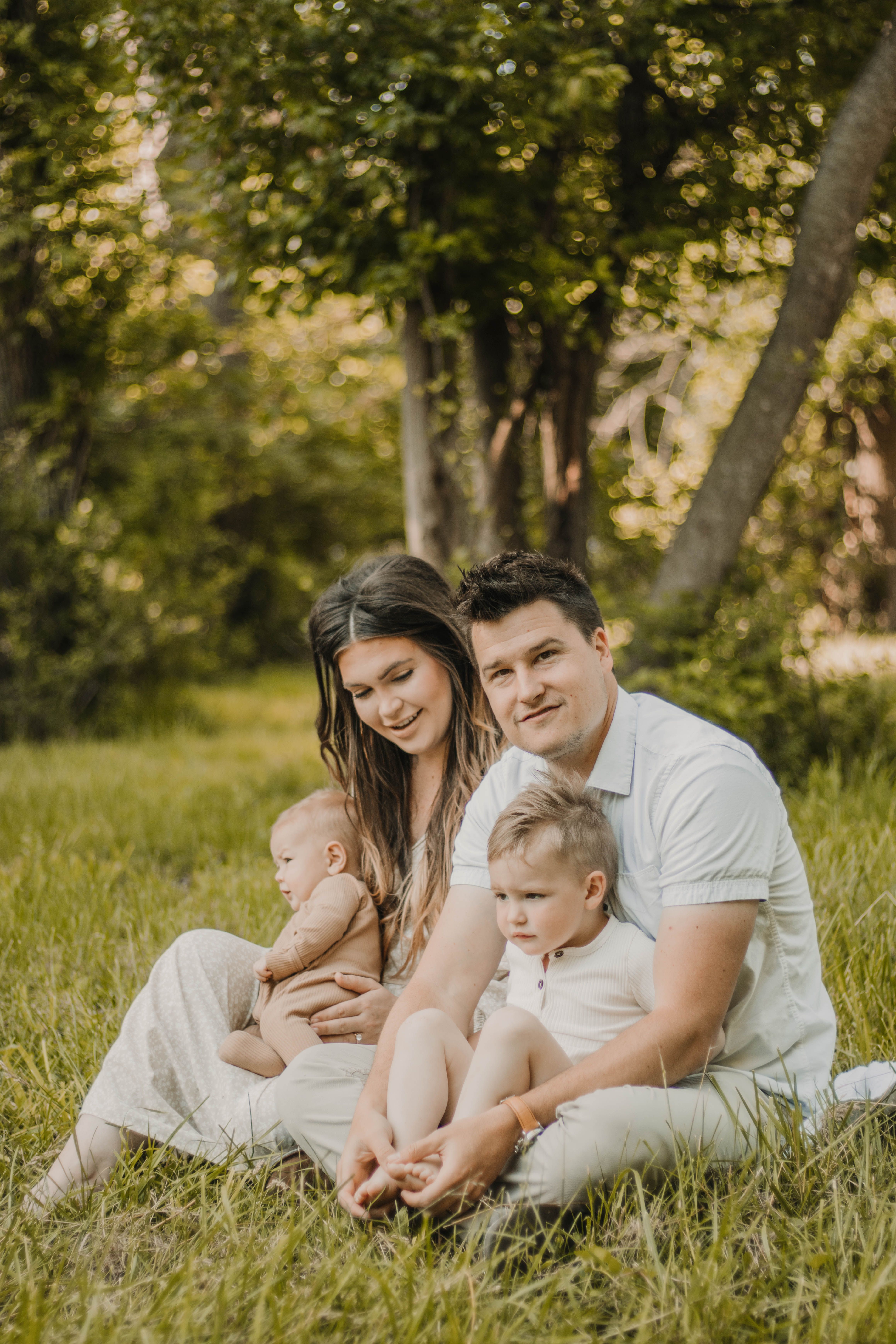 Family enjoying nature in serene outdoor setting · Free Stock Photo